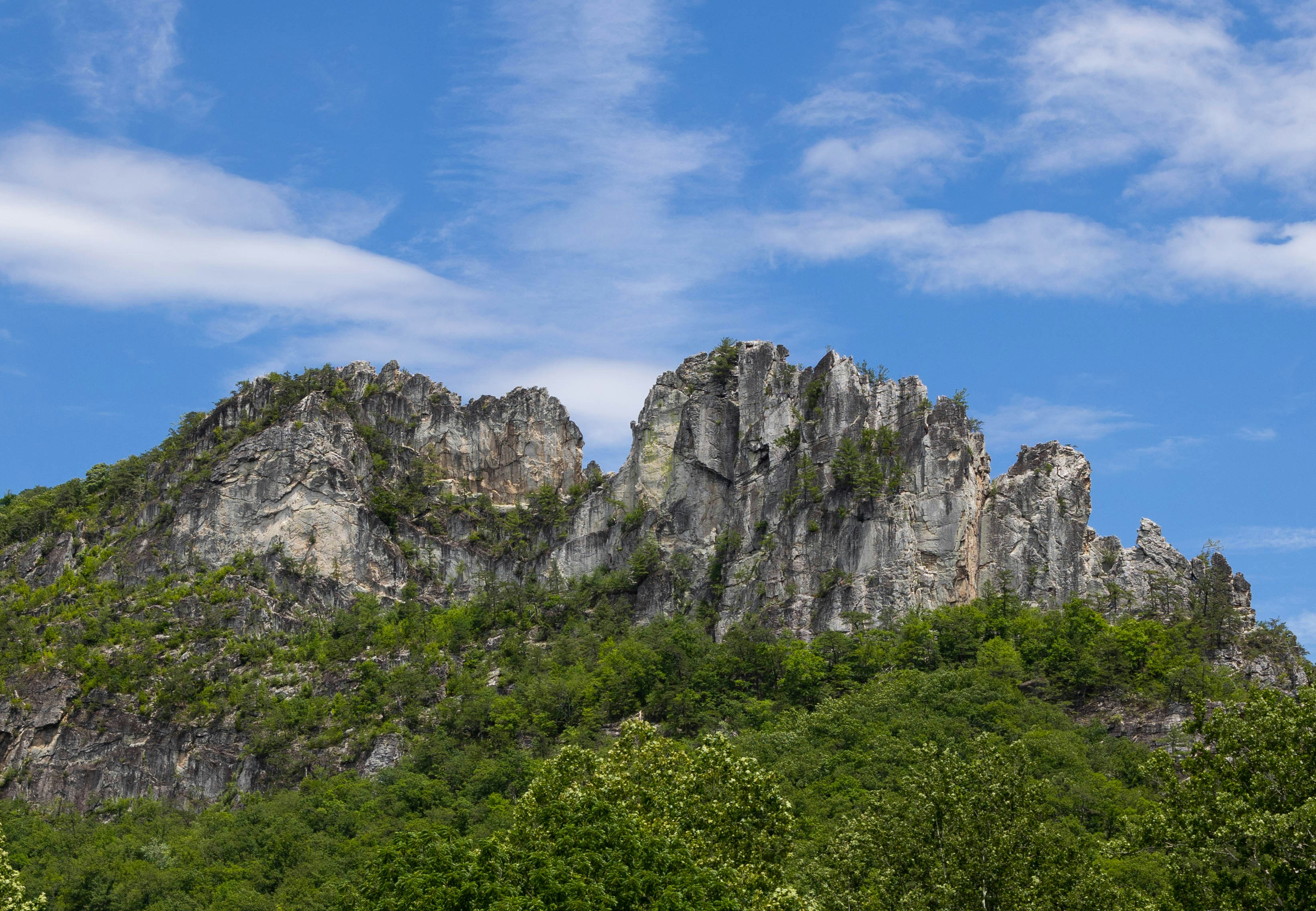 Rugged Granite Crest Above a Verdant Foothill