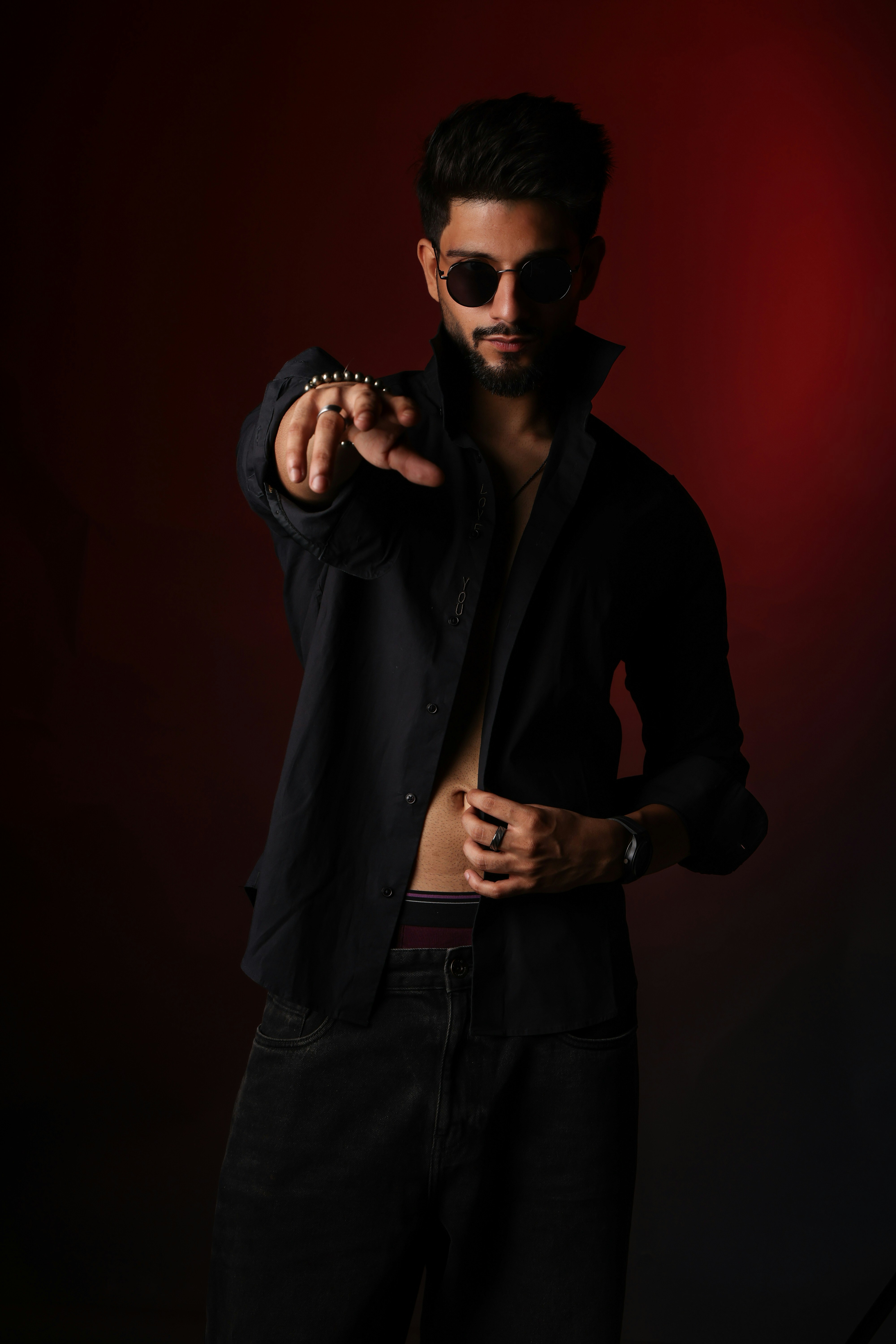 Dark Pulse: A Confident Gaze in Shadowed Red