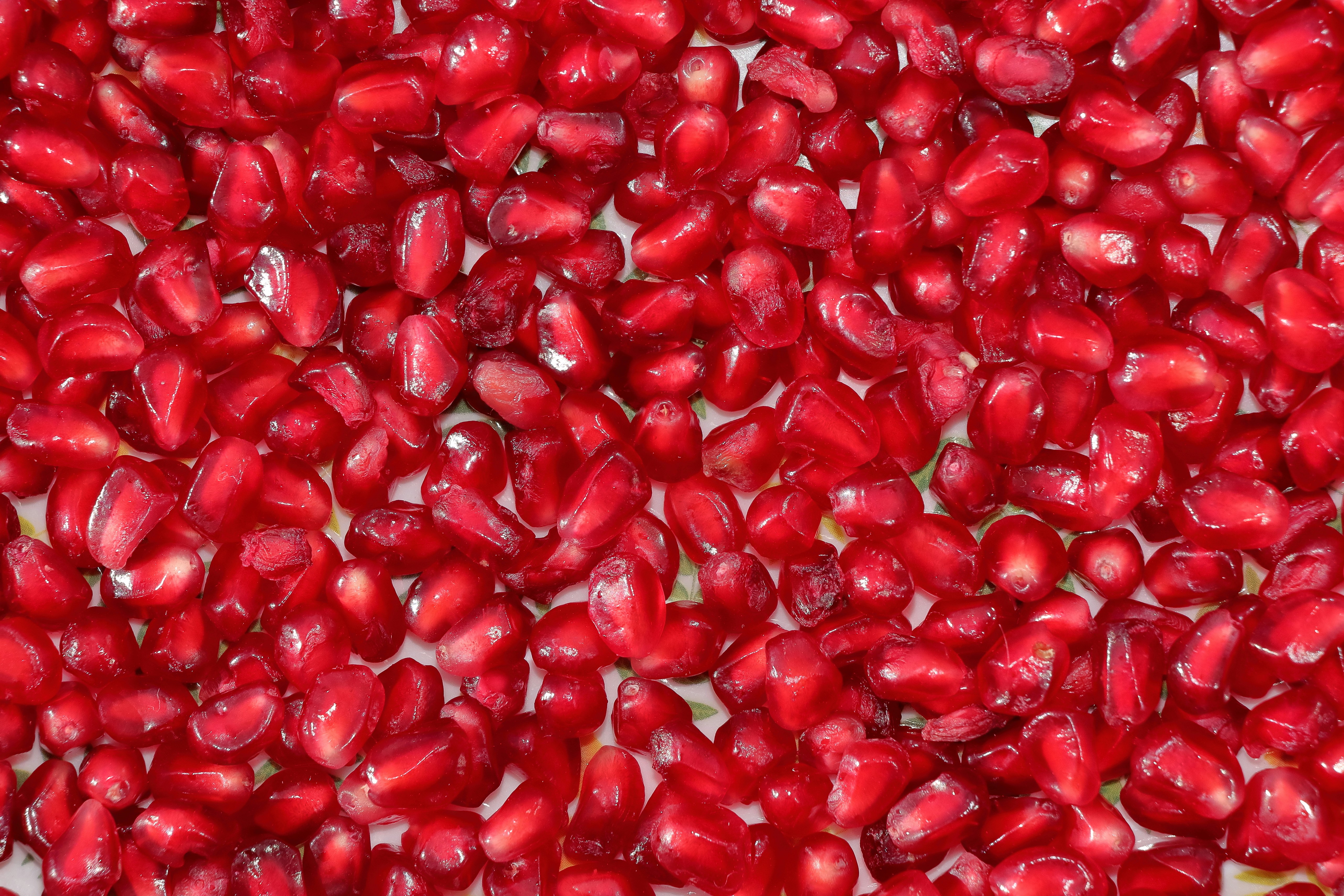 Crimson Pomegranate Seeds in a Sea of Red