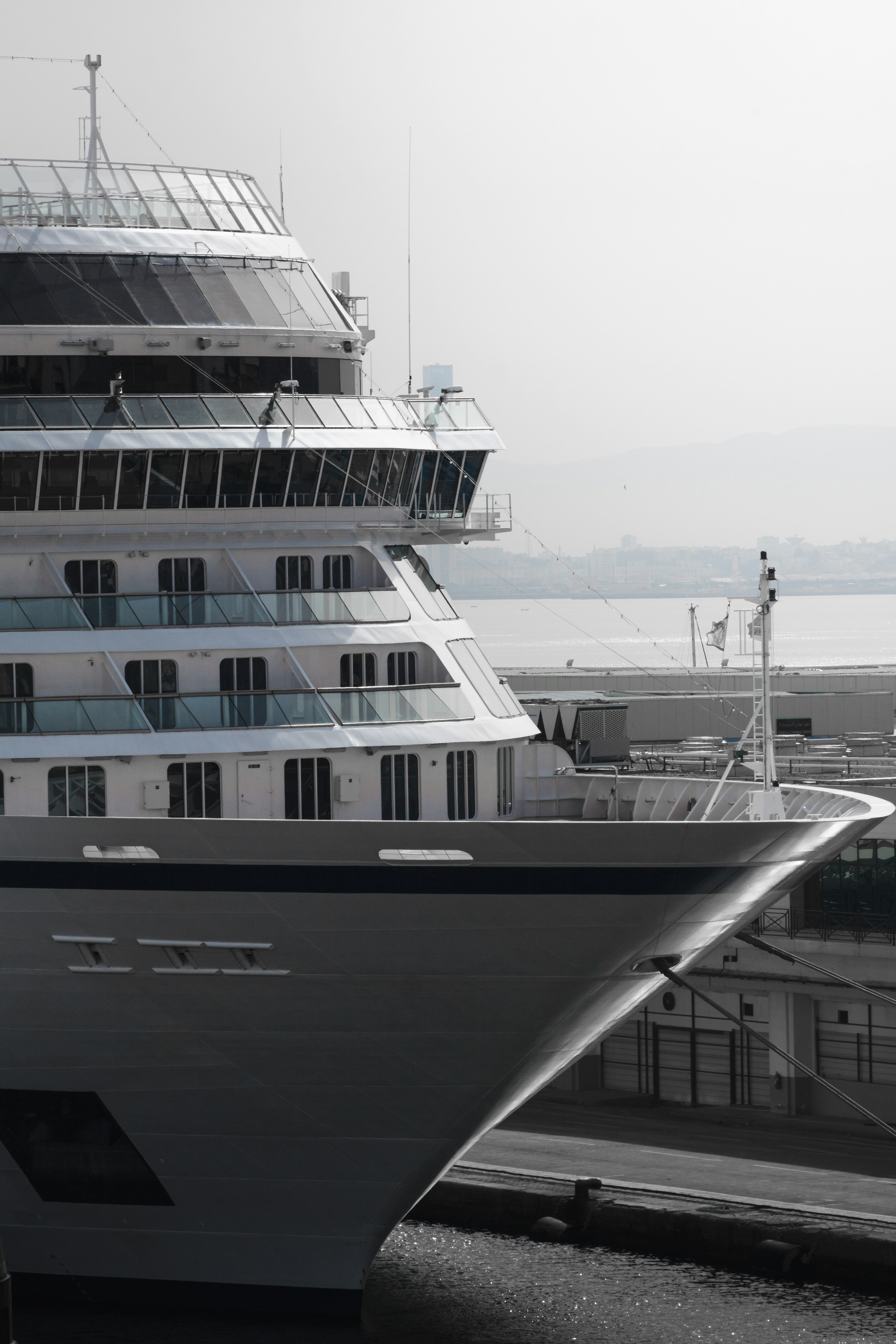 Maritime Majesty: The Bow Dominates in Quiet Harbor Light
