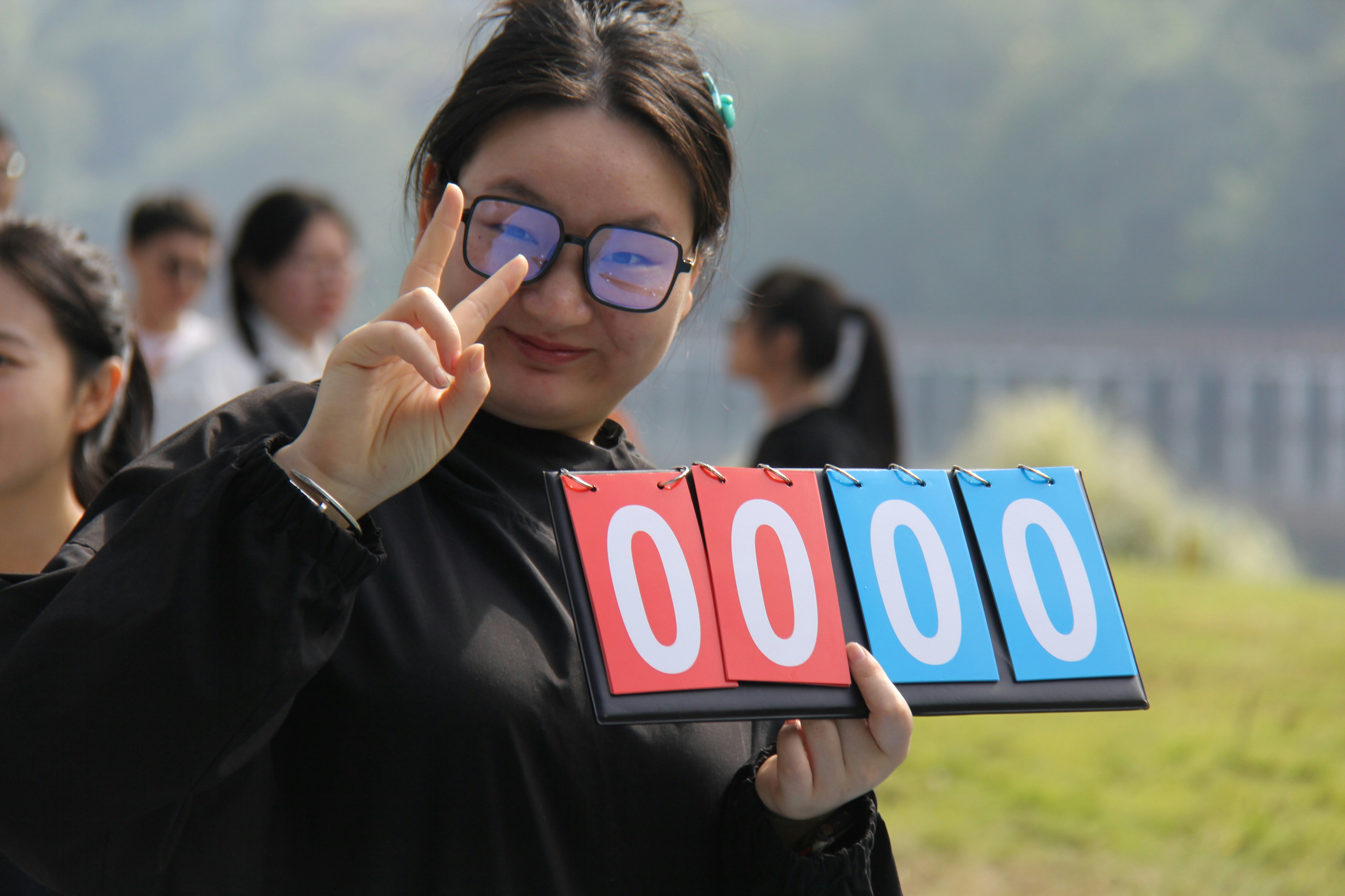 Peace Sign and Scoreboard: A Moment of Cheer