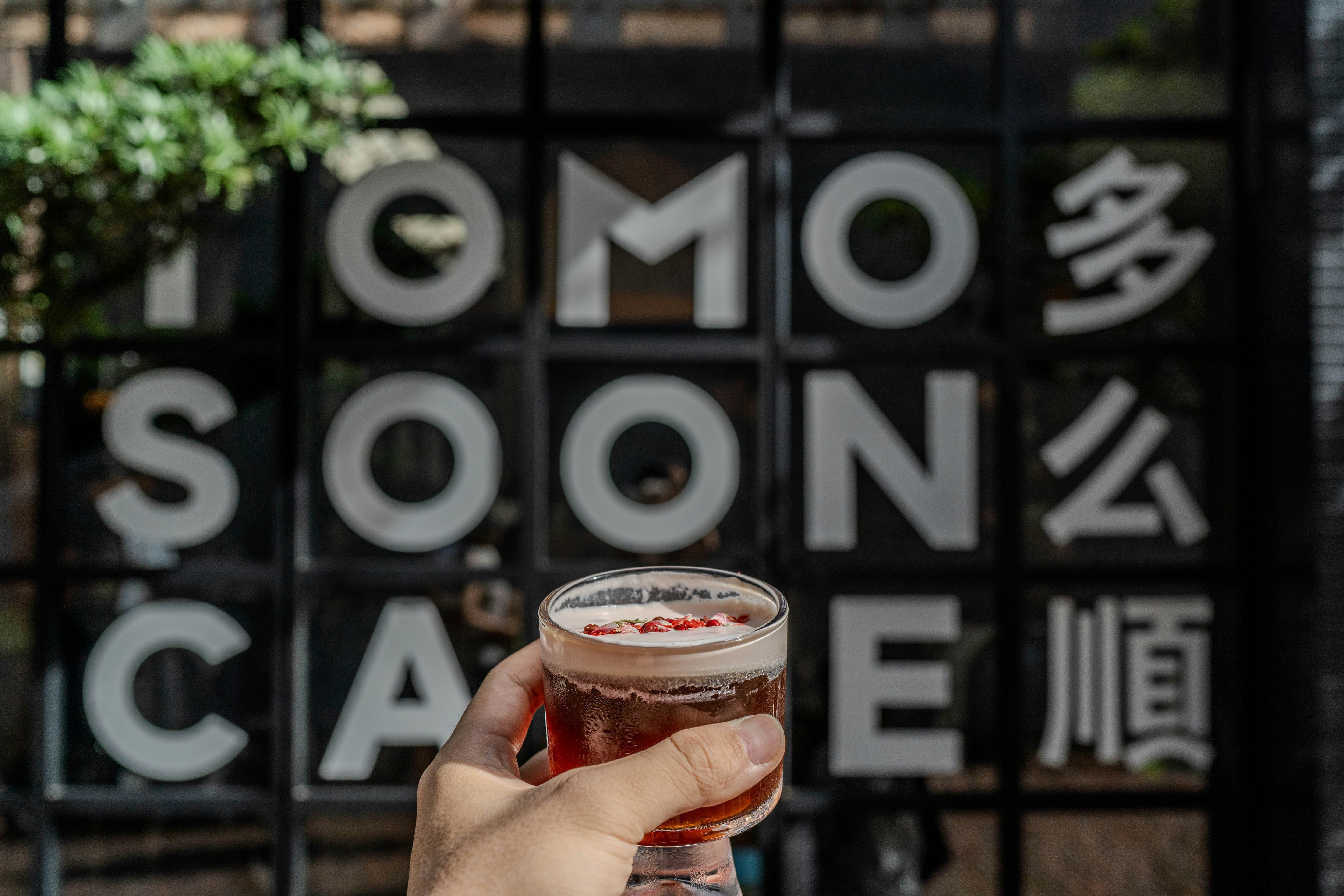A handheld Aperitif Before the Window to the Signs