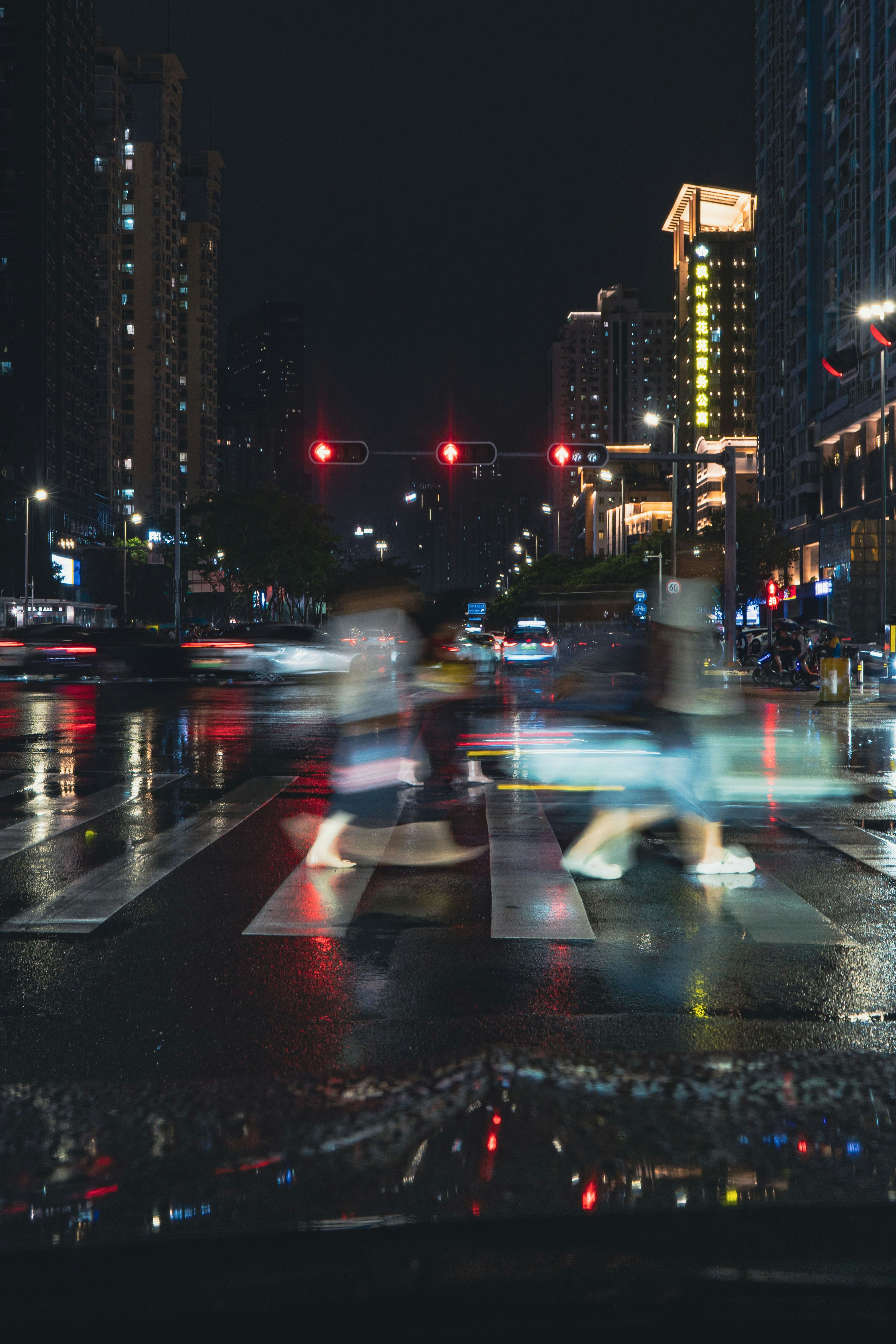 Midnight Crosswalk: Blurred Motion Under City Lights