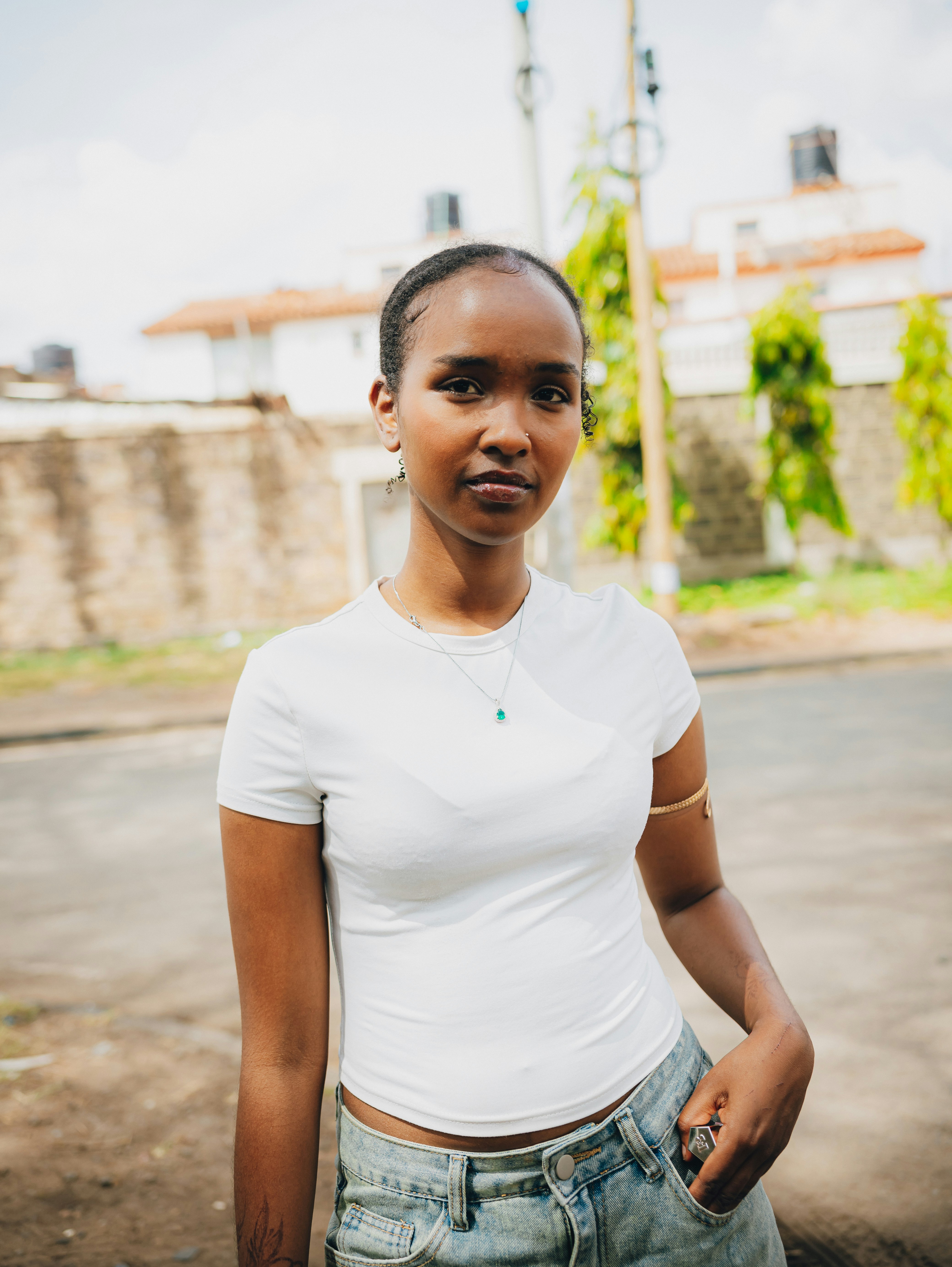 Portrait in Warm Light: A Quiet Confidence in White Tee