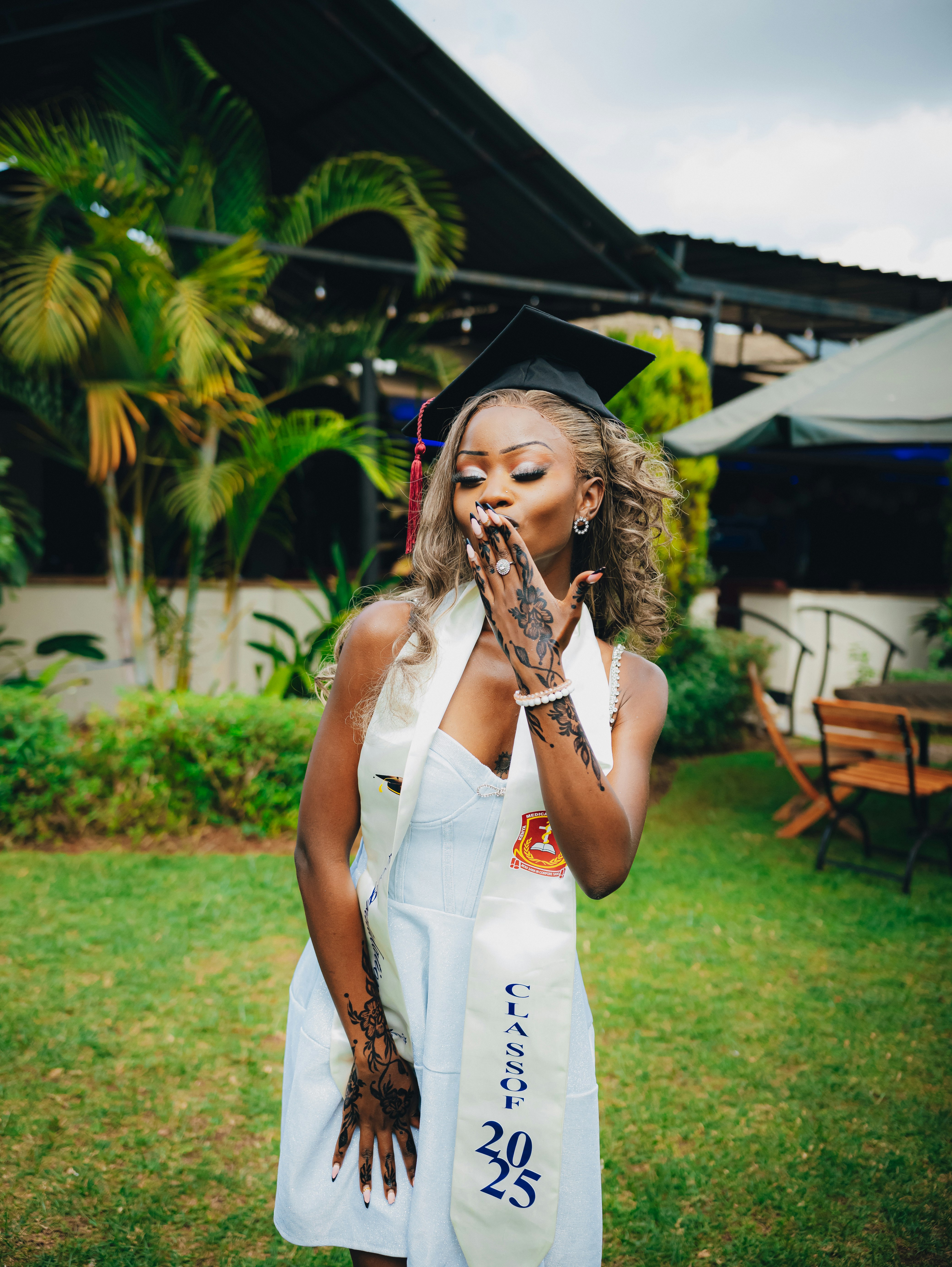 Graduation Glow: A Quiet Moment Amid Campus Greens