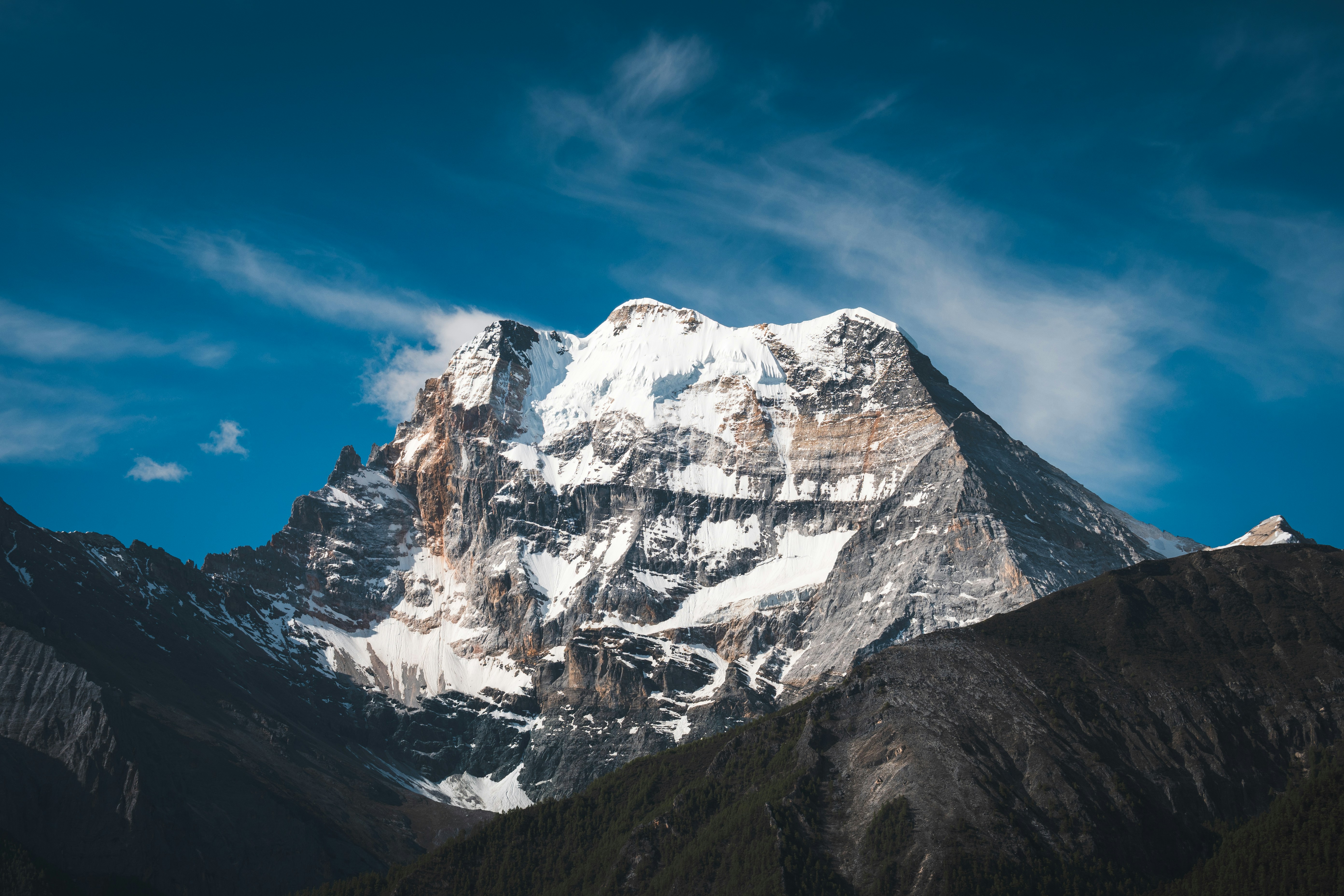 Snow-Crowned Peak Under a Clear Blue Canopy