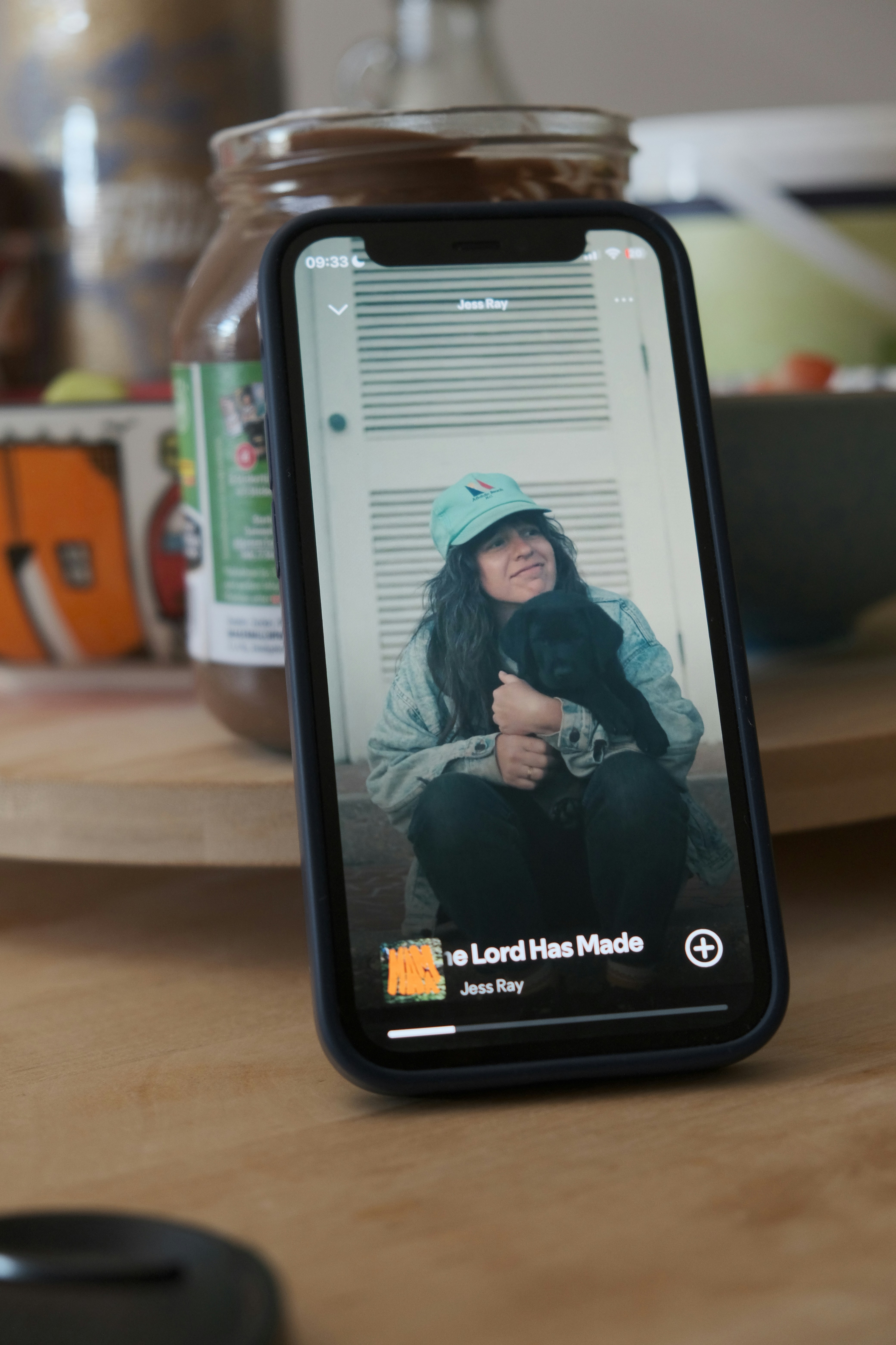 Phone Screen Portrait: A woman with a dog rests inside a teched-out frame