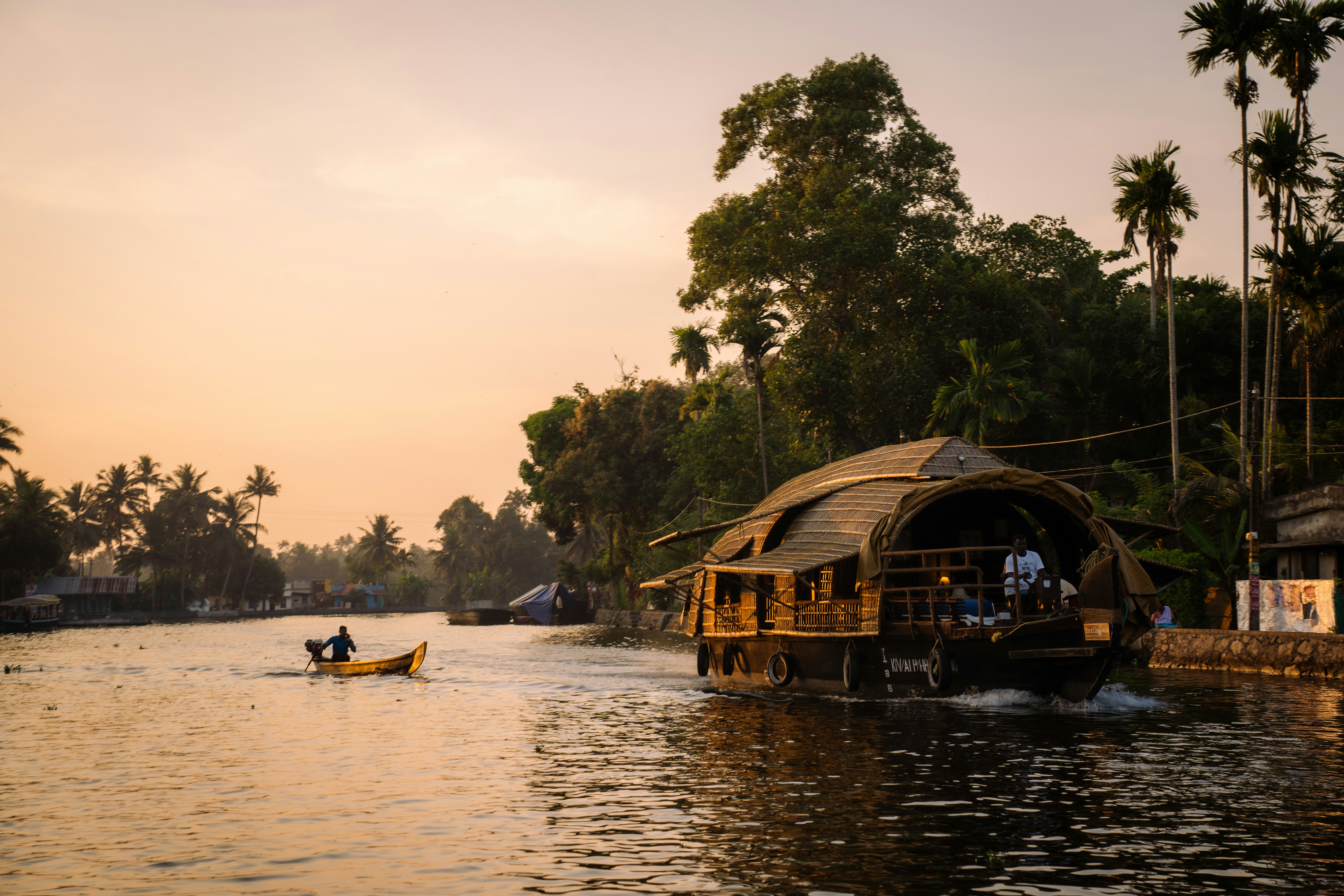 Sunset on the Waterway: The Palm-Walled Houseboat at Dusk