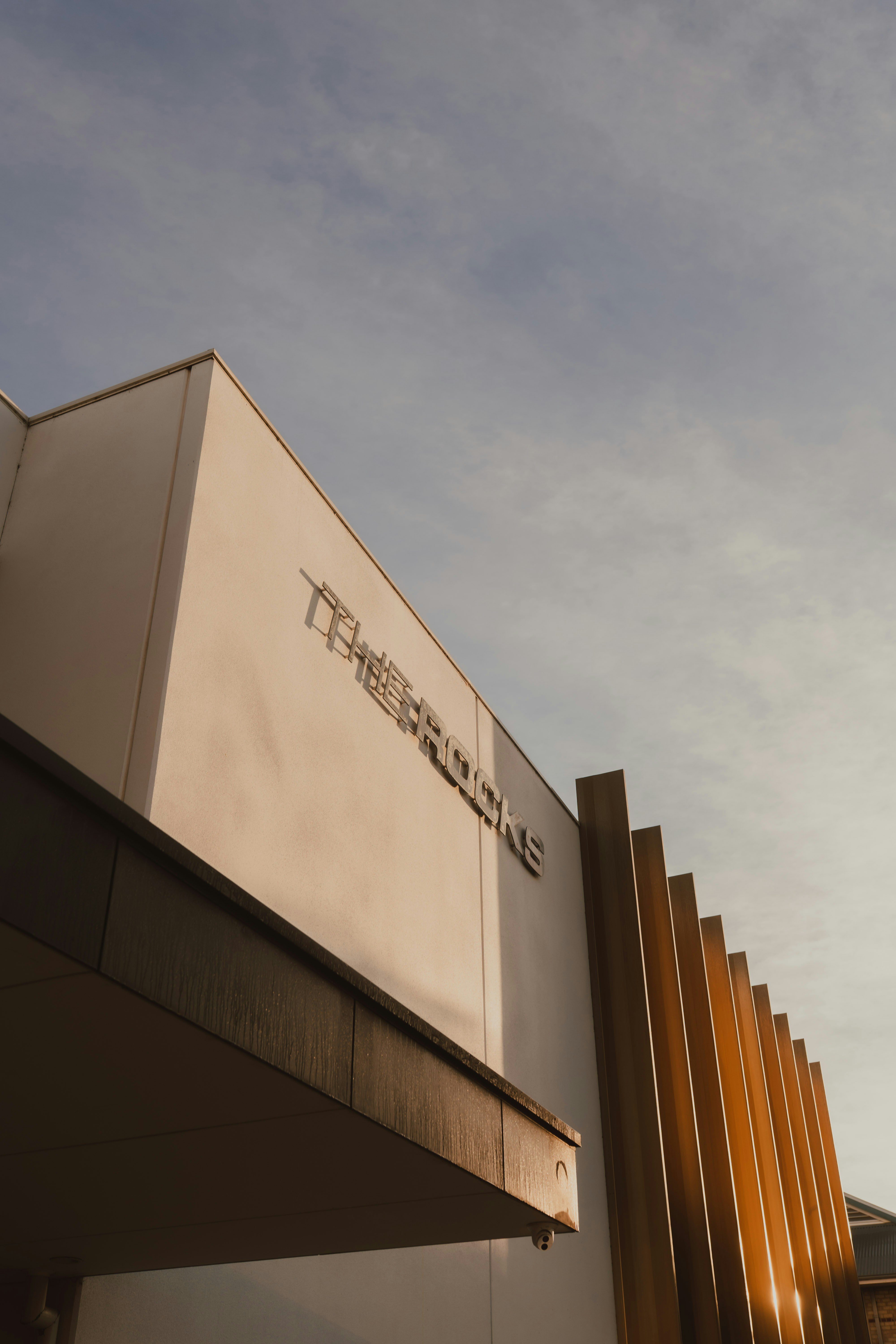 Facade of a Modernist Building Bathed in Golden Light