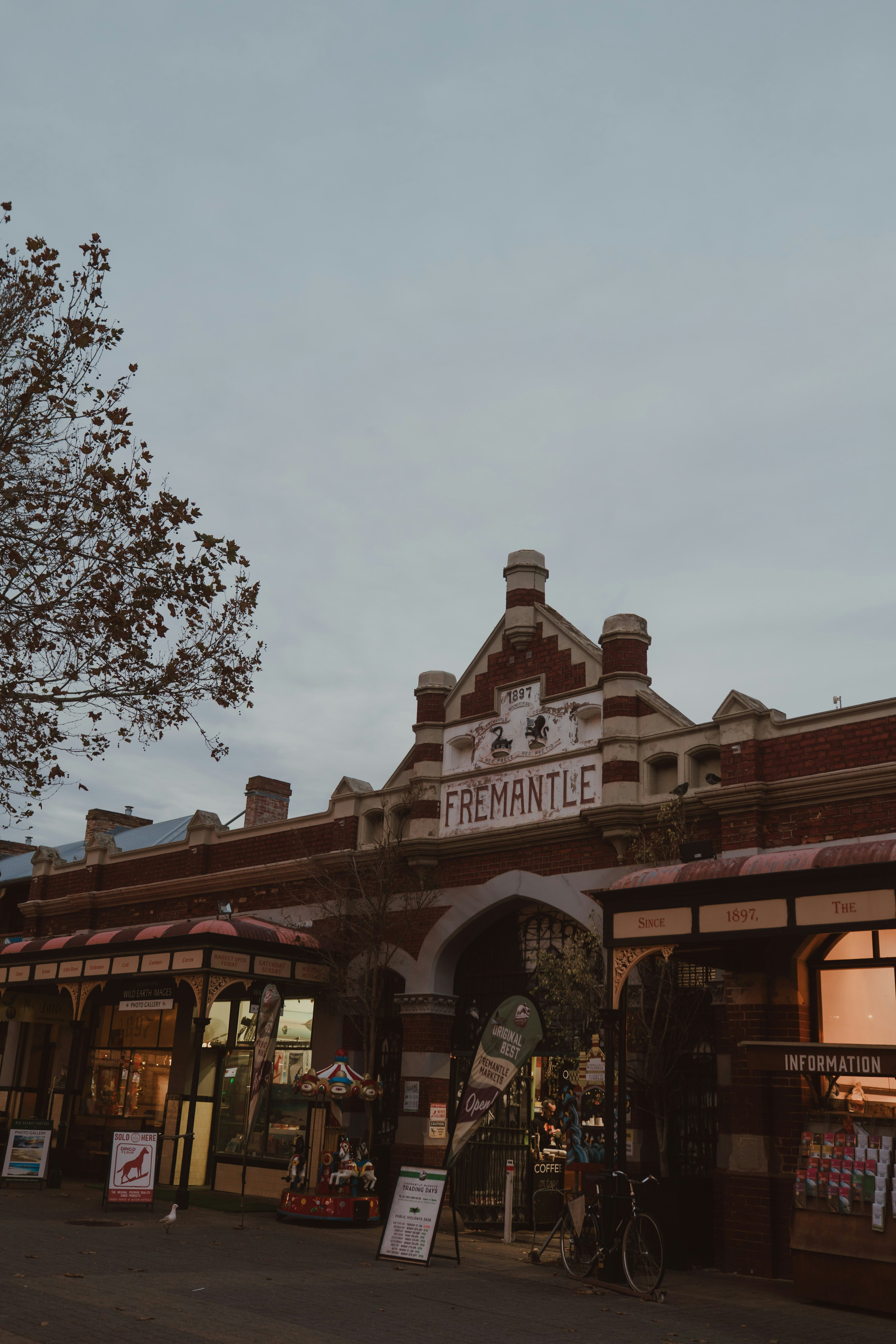 Fremantle Market Facade at Dusk: Brick Architecture and Corner Shopfronts