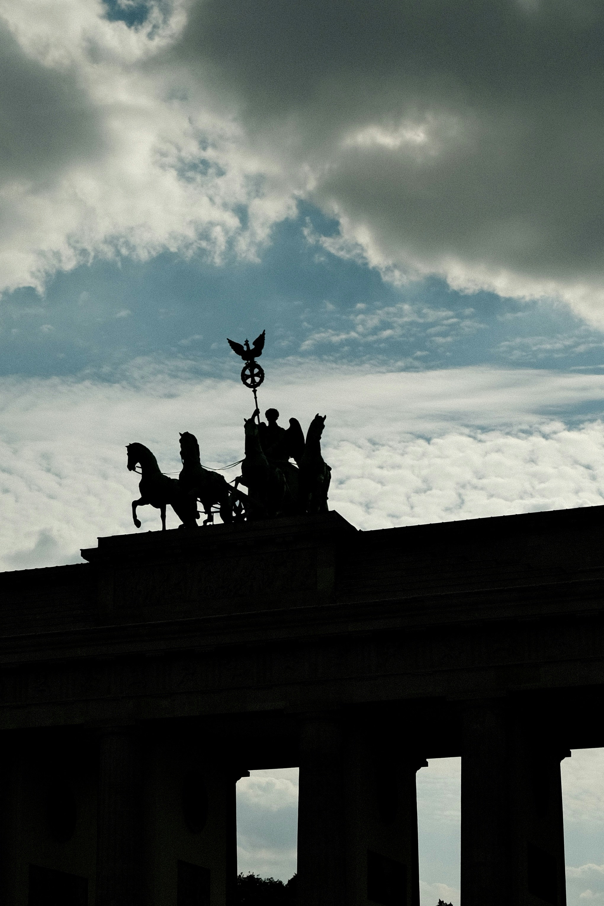 Chariot of Shadows Against a Velvet Sky