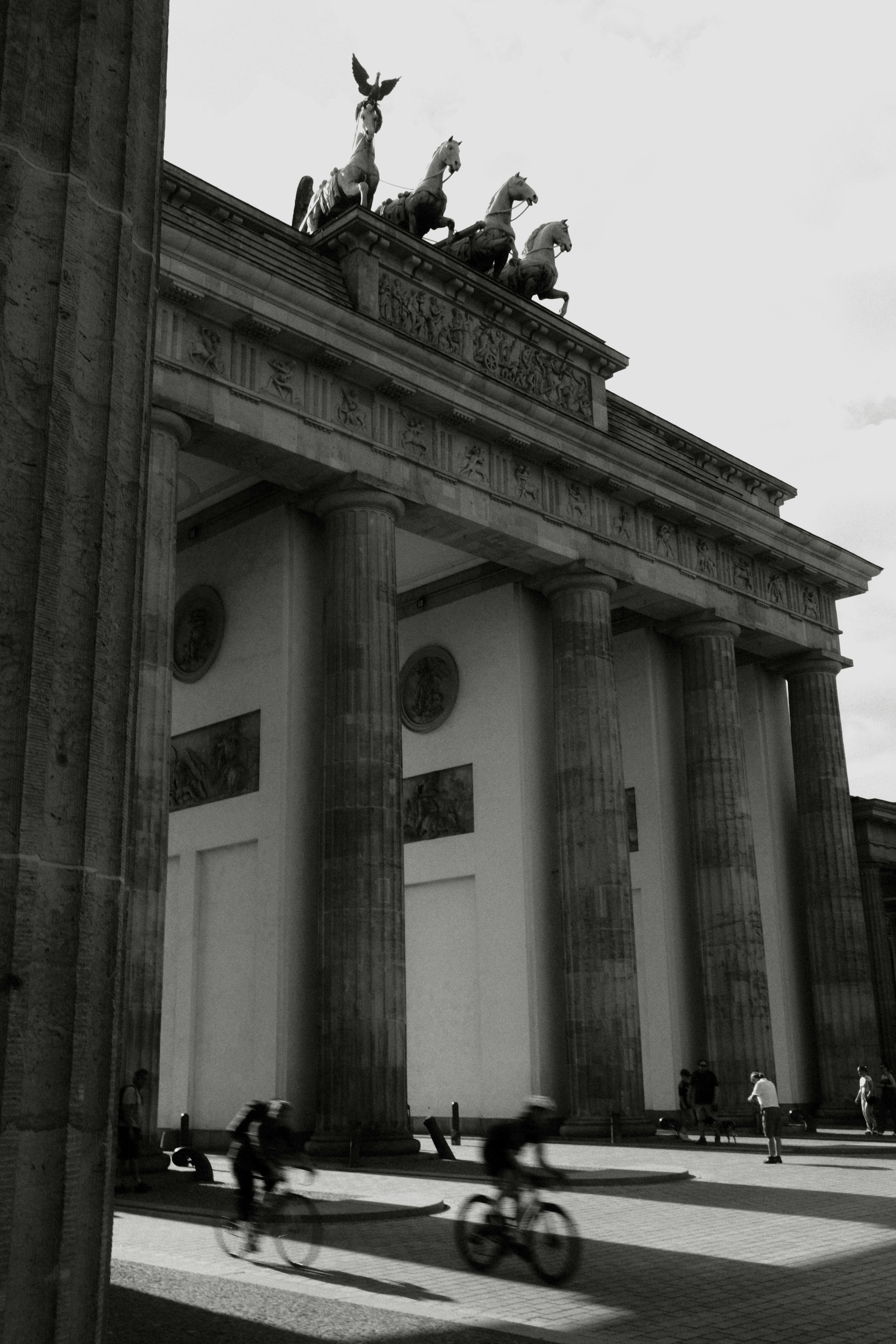 Architectural Grandeur: Chariot Figures Guarding the Monumental Portico