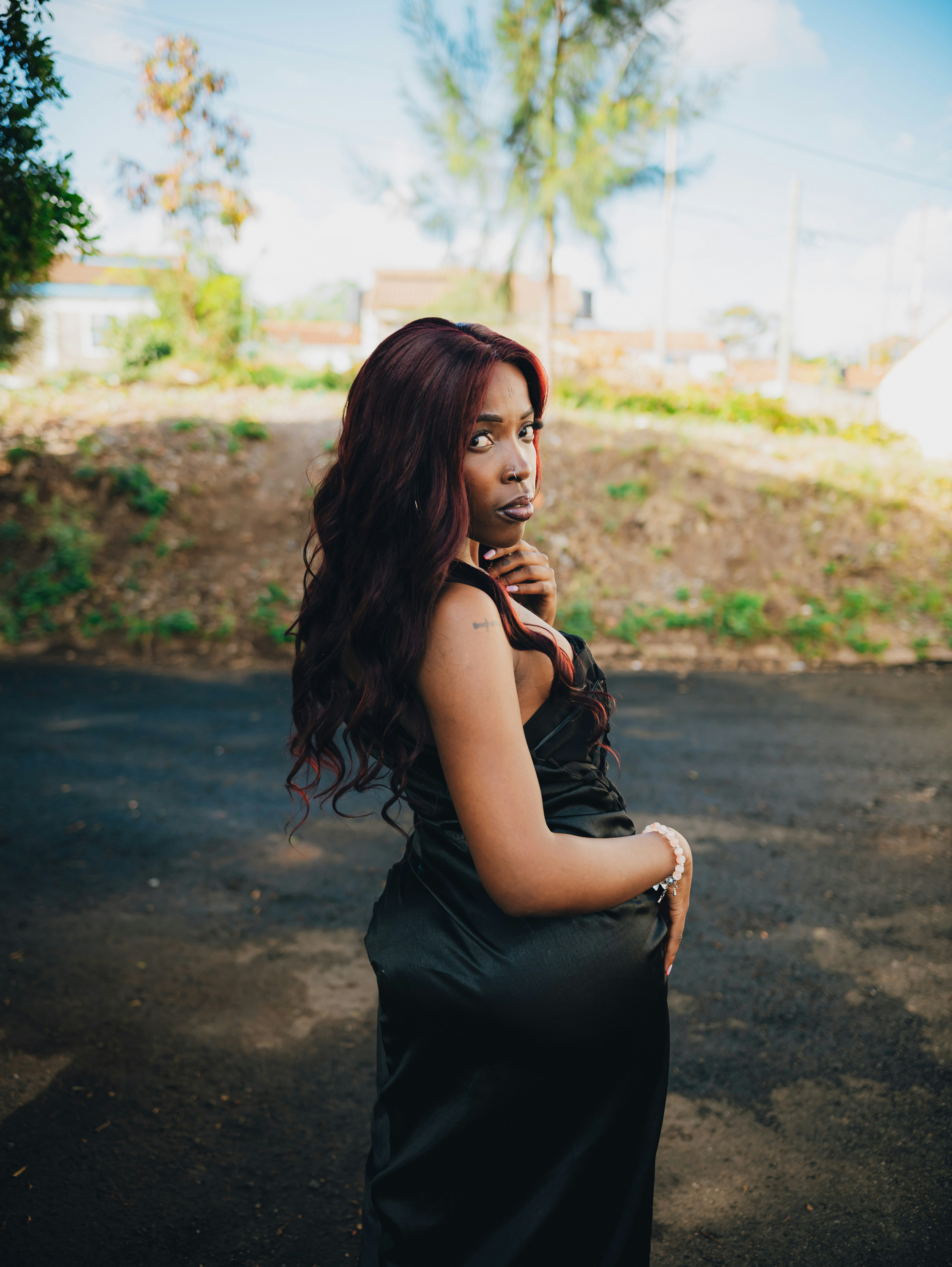 Midday Silhouette: Portrait in a Sunlit Urban Backdrop