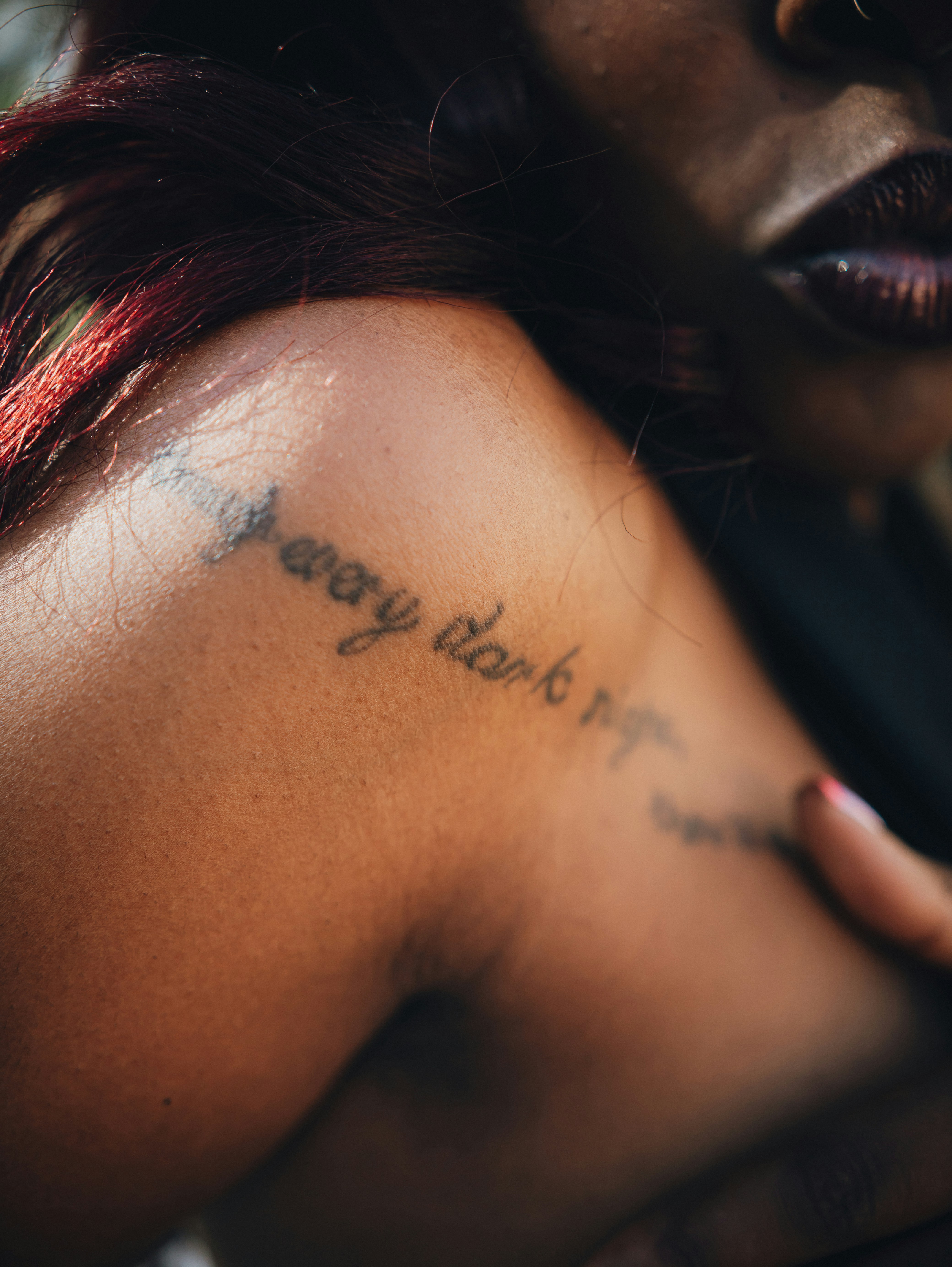 Tattooed Shoulder: Script Ink Tracing Quiet Intimacy