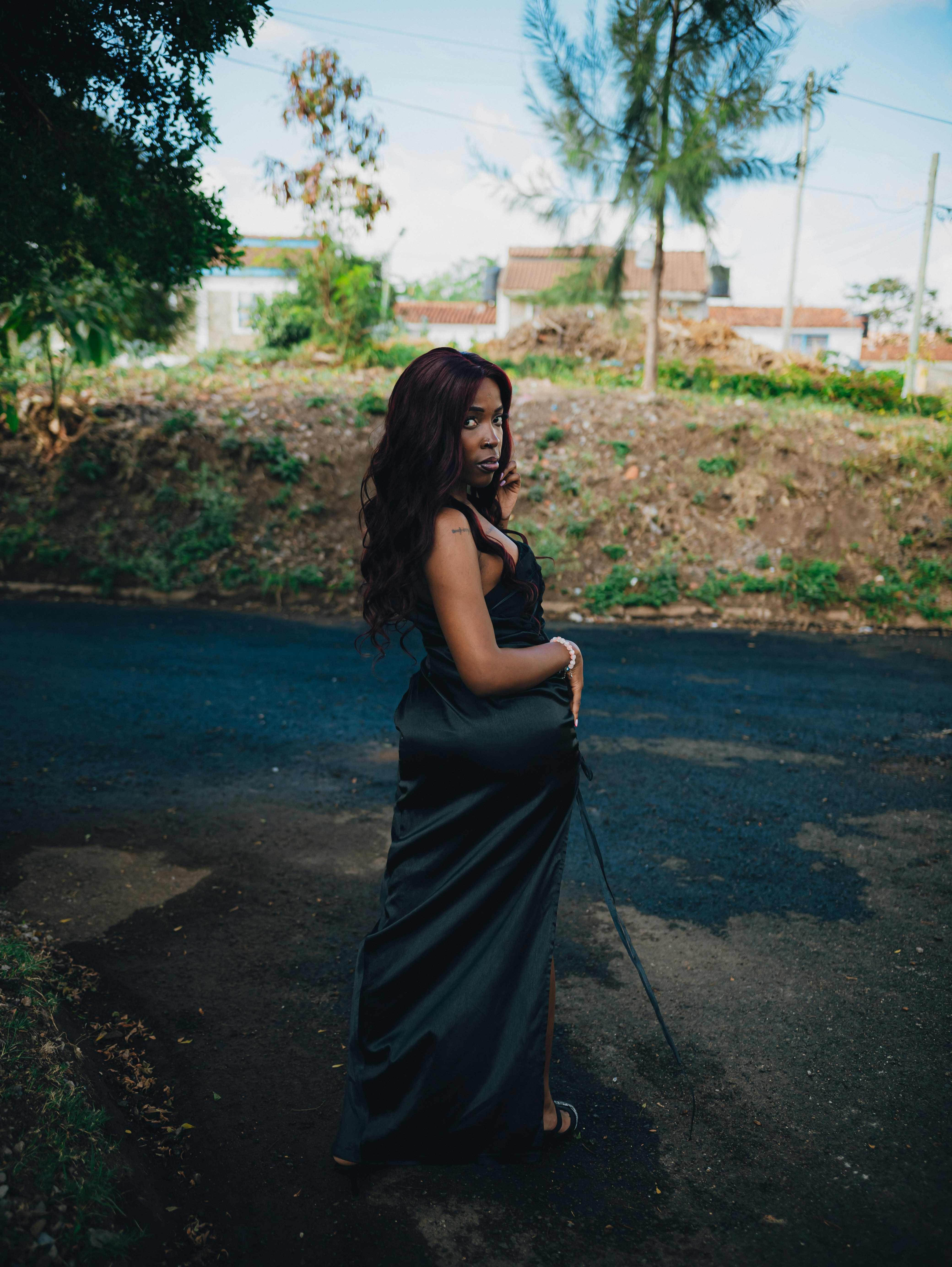 Midnight Velvet: a poised silhouette in satin on a sunlit street