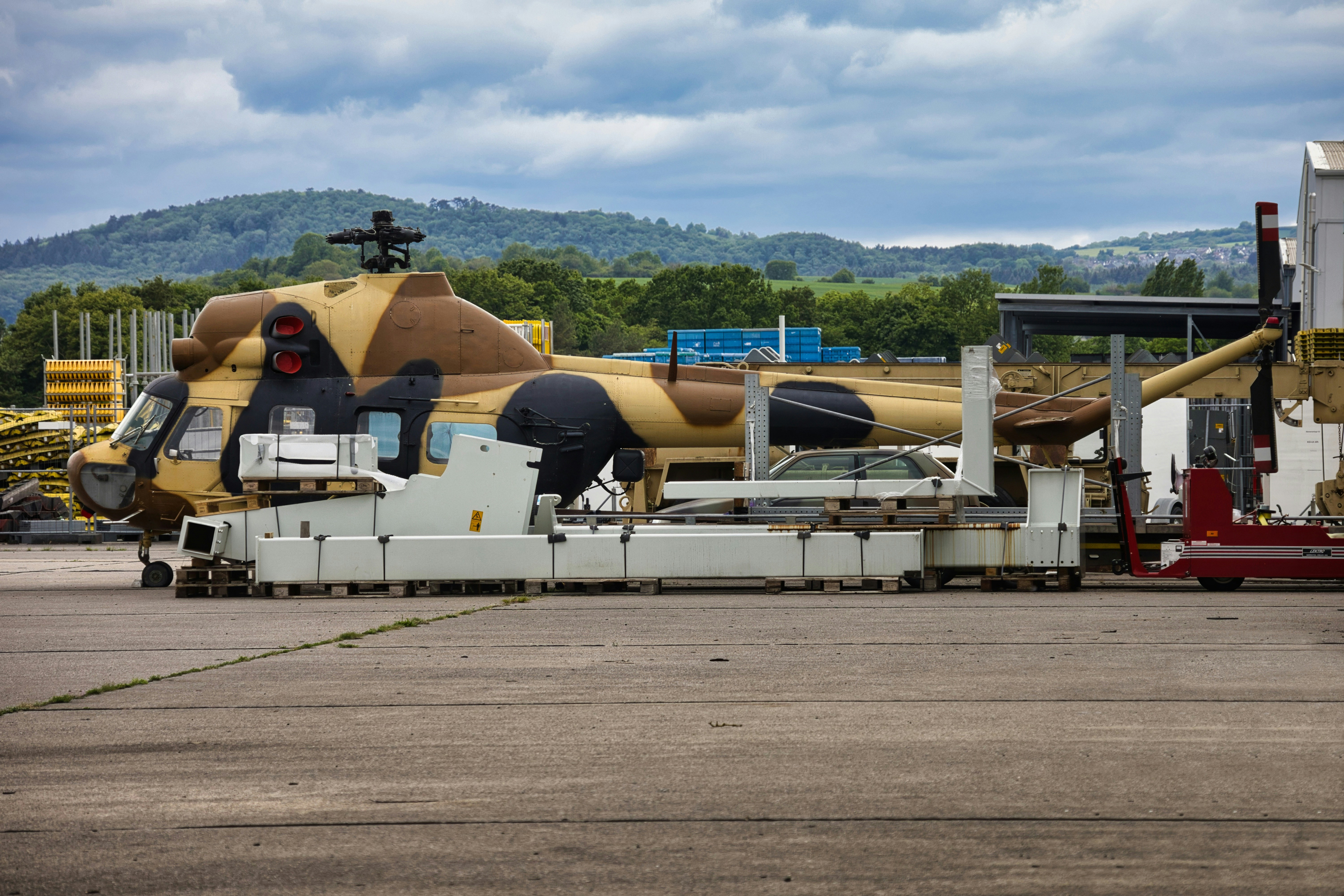 Desert Camouflage on the Tarmac: A Forgotten Helicopter and Ground Equipment
