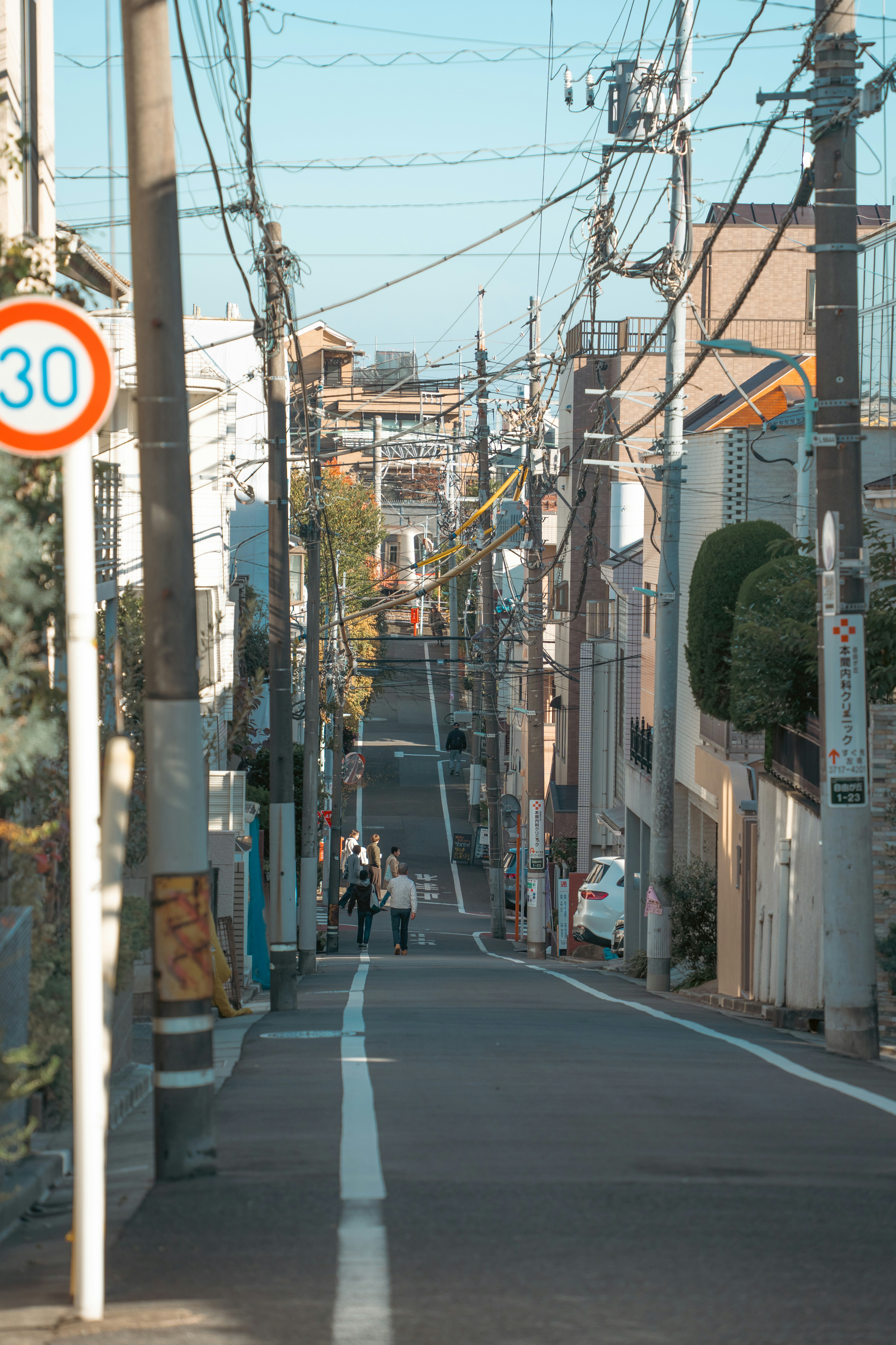Urban Ascent: A Quiet Street receding into light