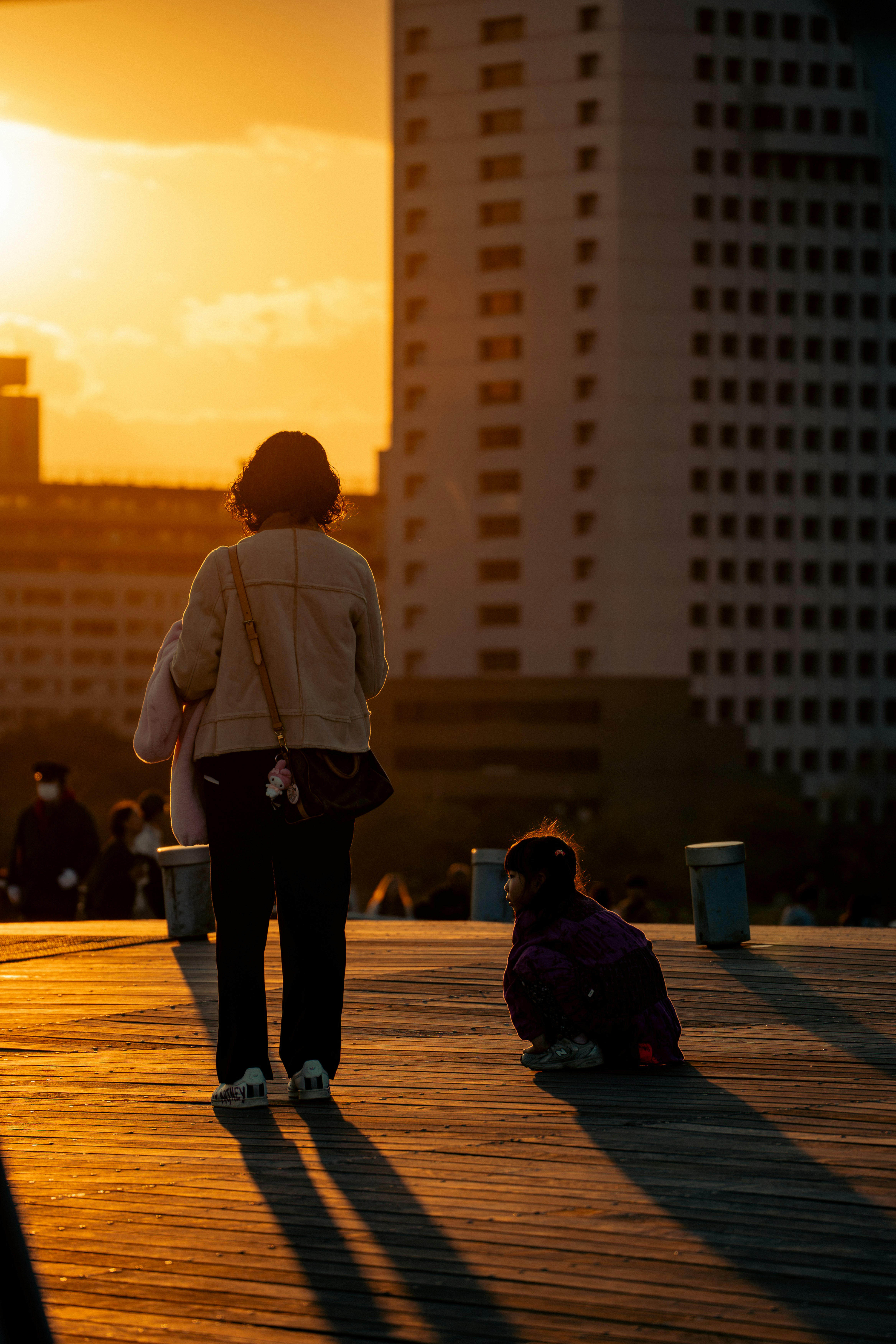 Sunsetwalk: A Quiet Moment Between Shadows on the Pier