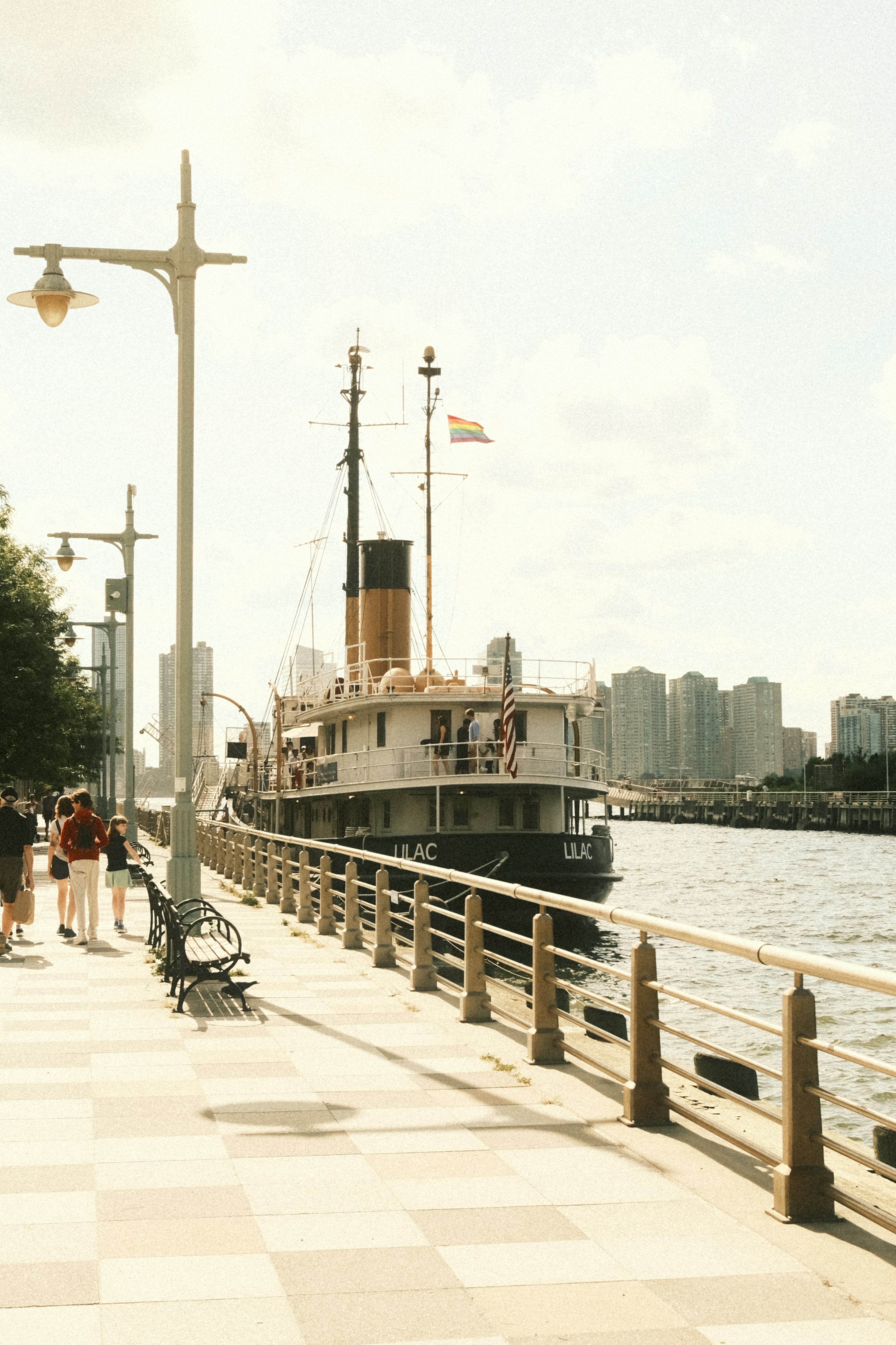 Harbor Promenade: A Vintage Steamer at the Waterfront Parade