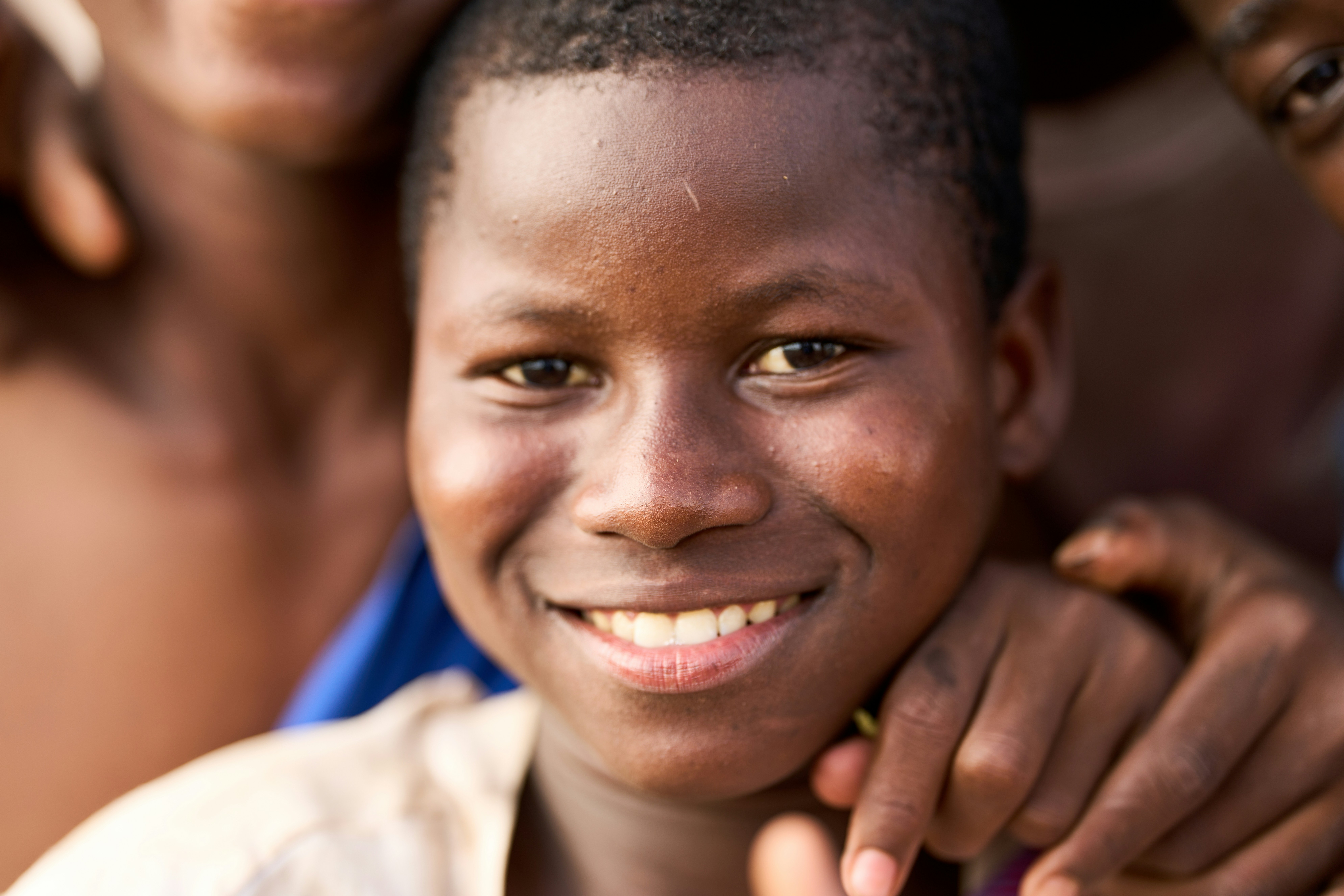 Bright Smile, Shared Moment: A Close-Up of Friendship