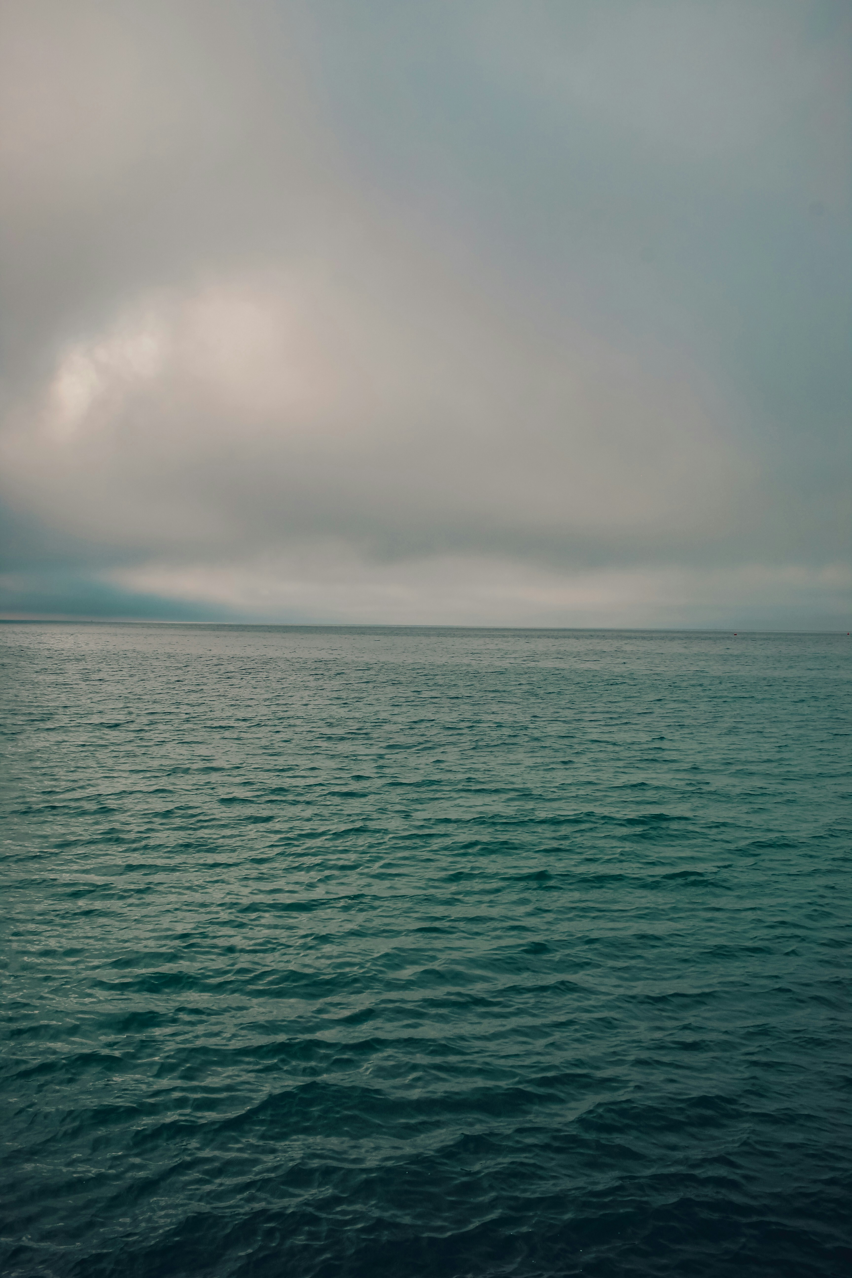 Horizon Breath: Quiet Sea under Clouded Sky