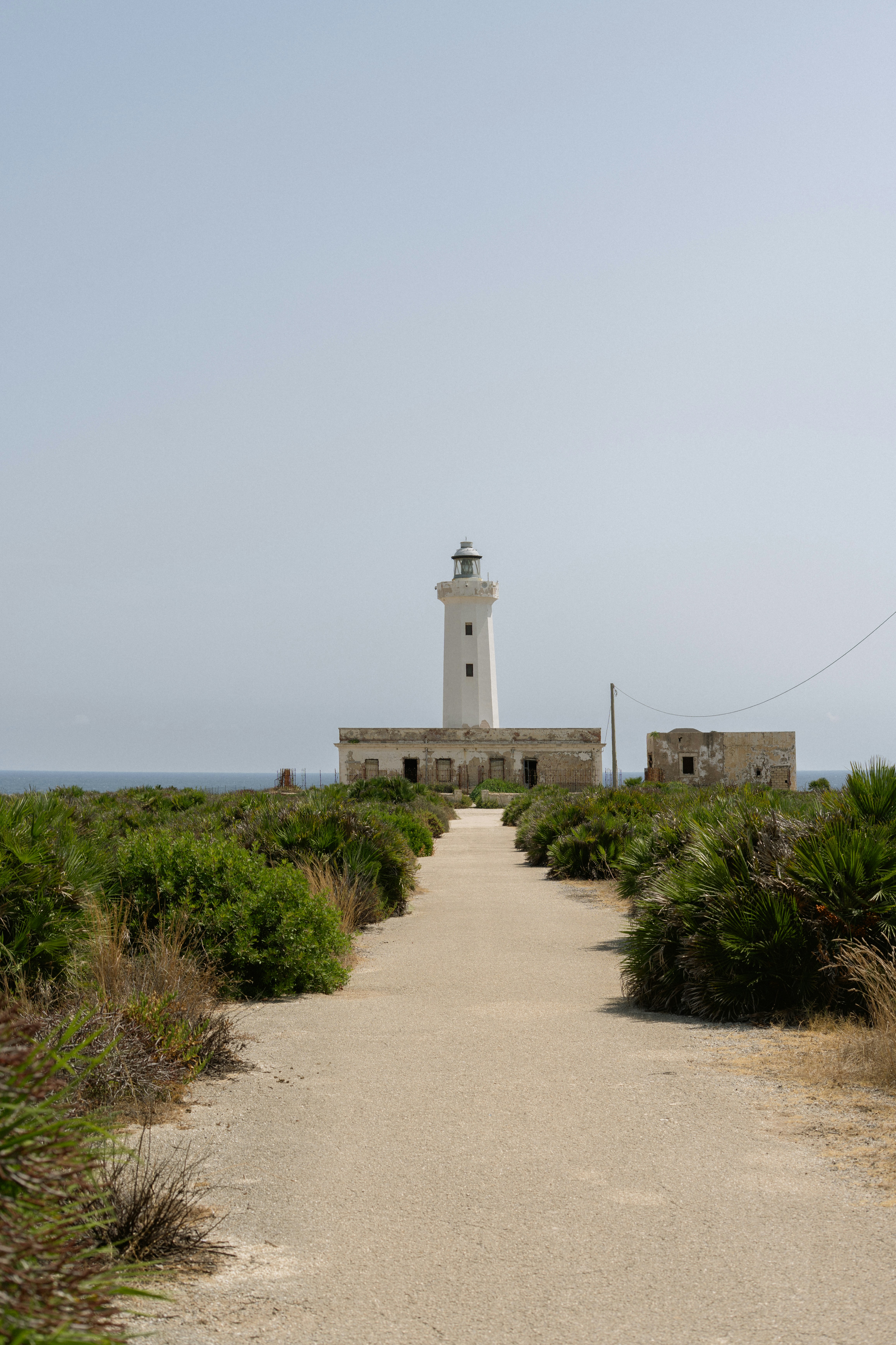 Lighthouse Path: A Sunlit Walk to the Beacon