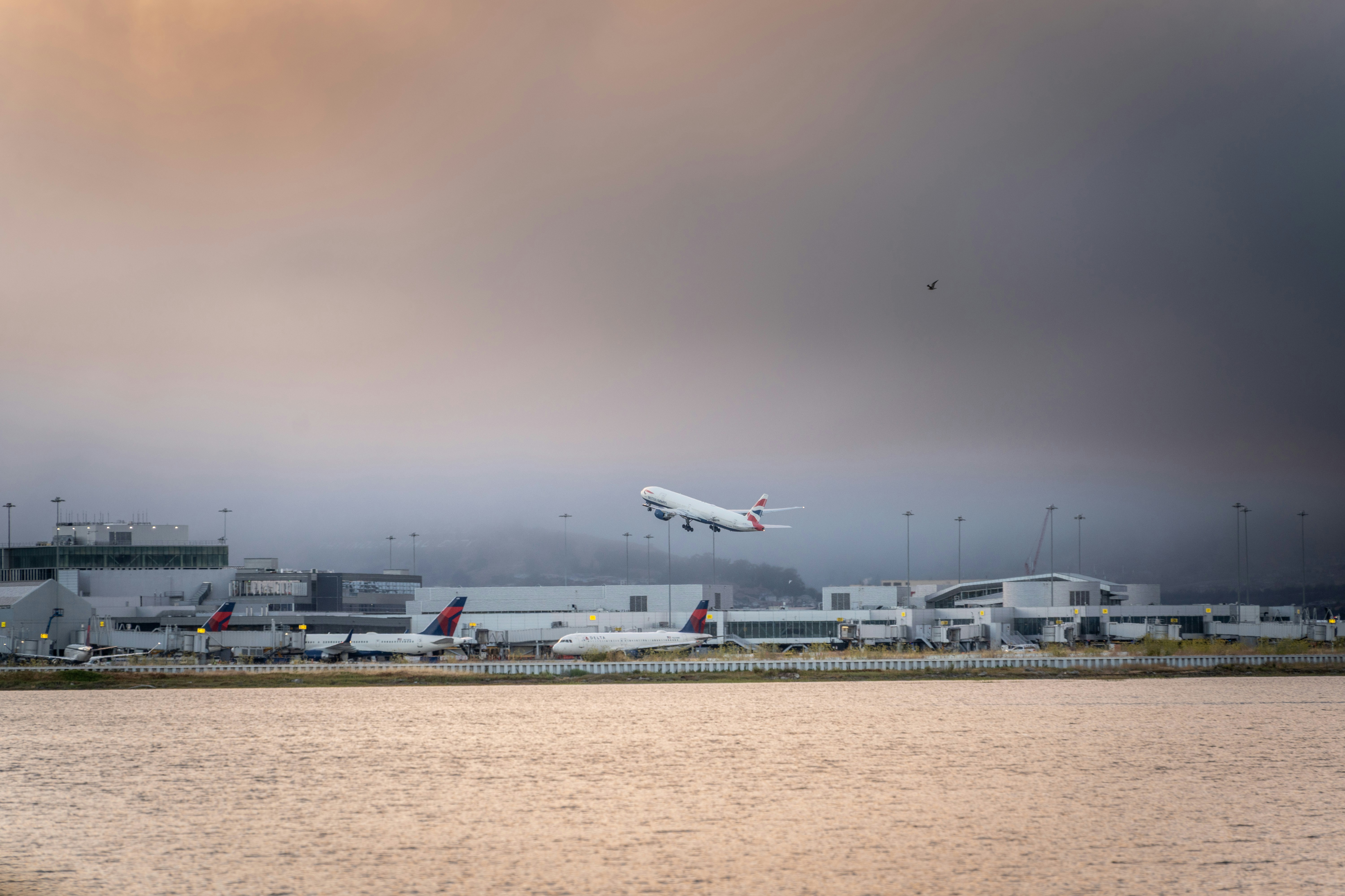 Airliner Rising Over Atlantic Silhouette at Dusk