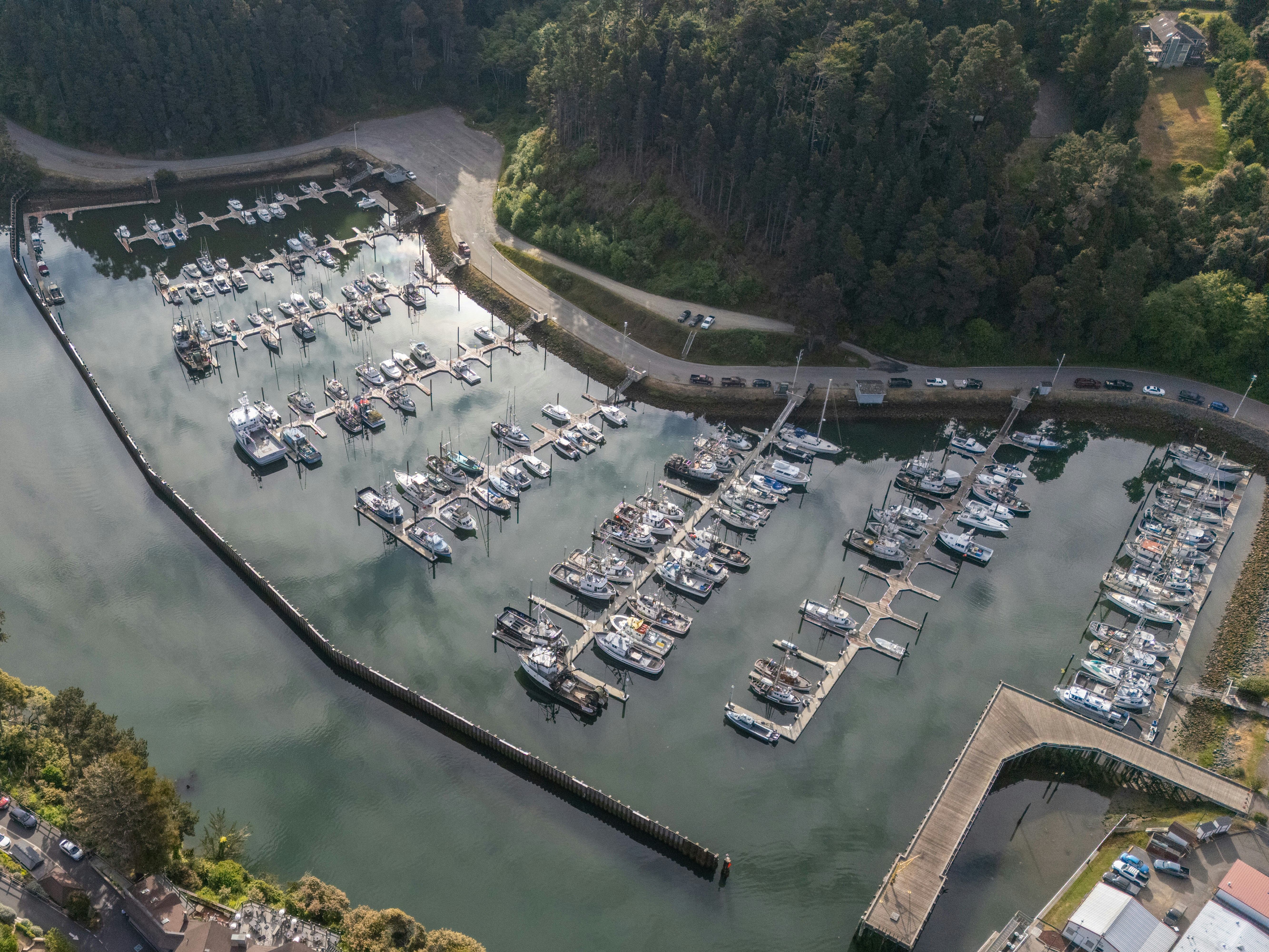 Aerial Corridor: Boats Nestled in a Curved Marina