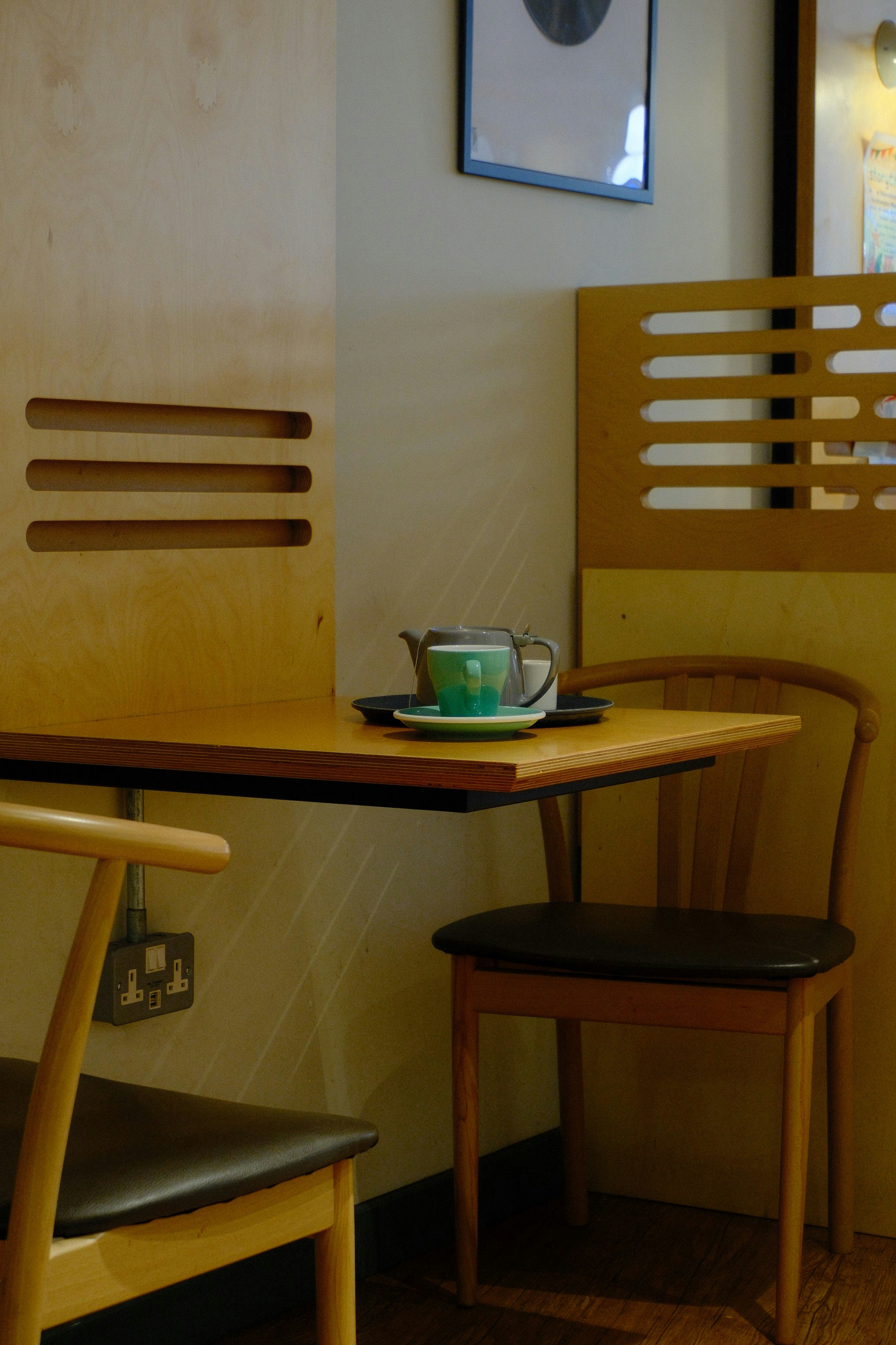 Tea on a Quiet Corner: A Minimalist Café Still Life