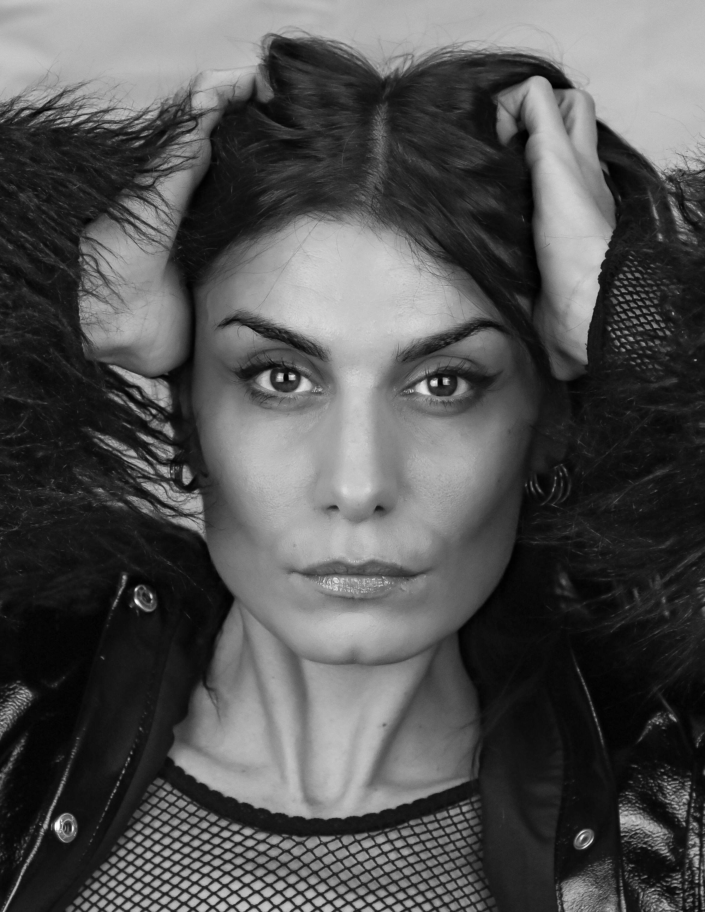 Intense Gaze: Portrait in Mono with Framing Emphasis
