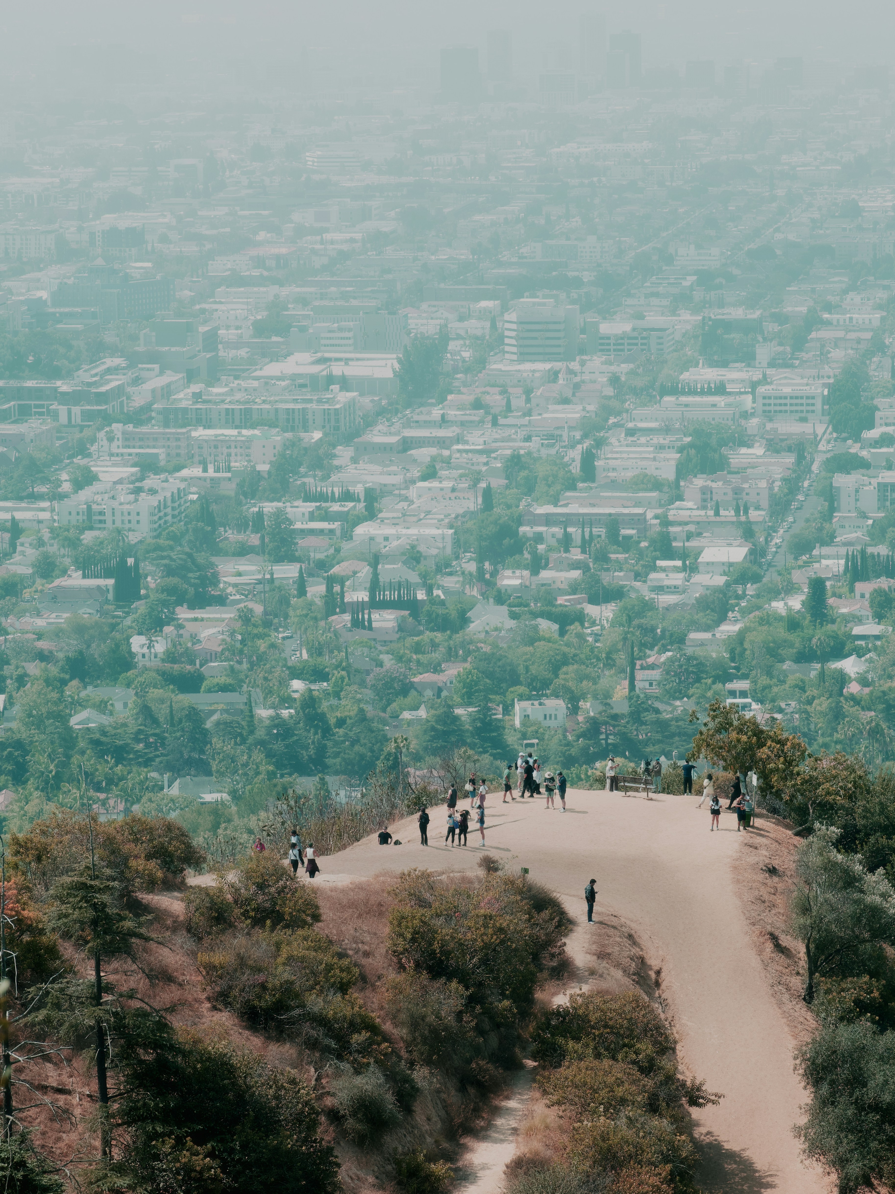 Along the Hilltop Path: People About the City Below