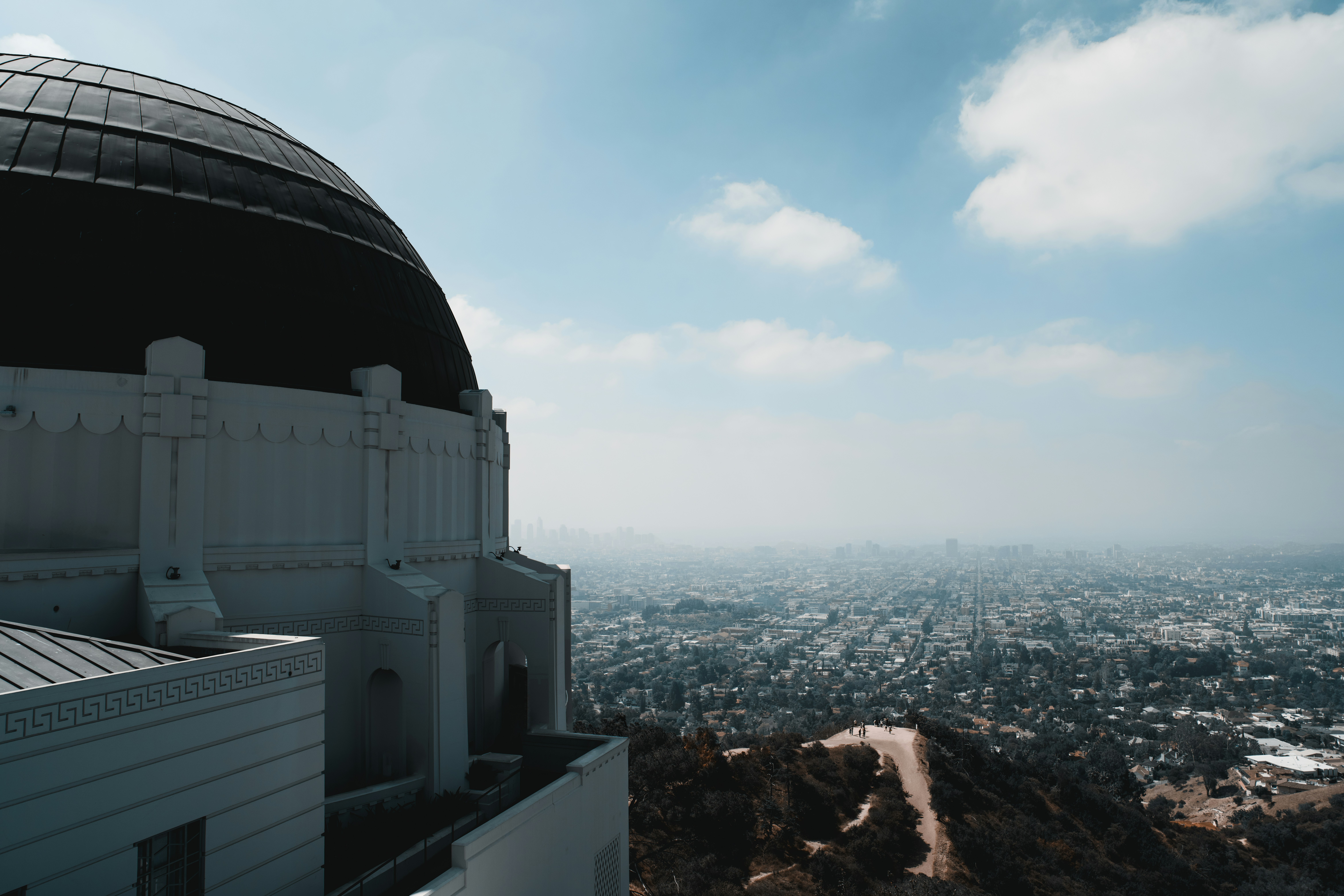  domed observatory over a sprawling cityscape