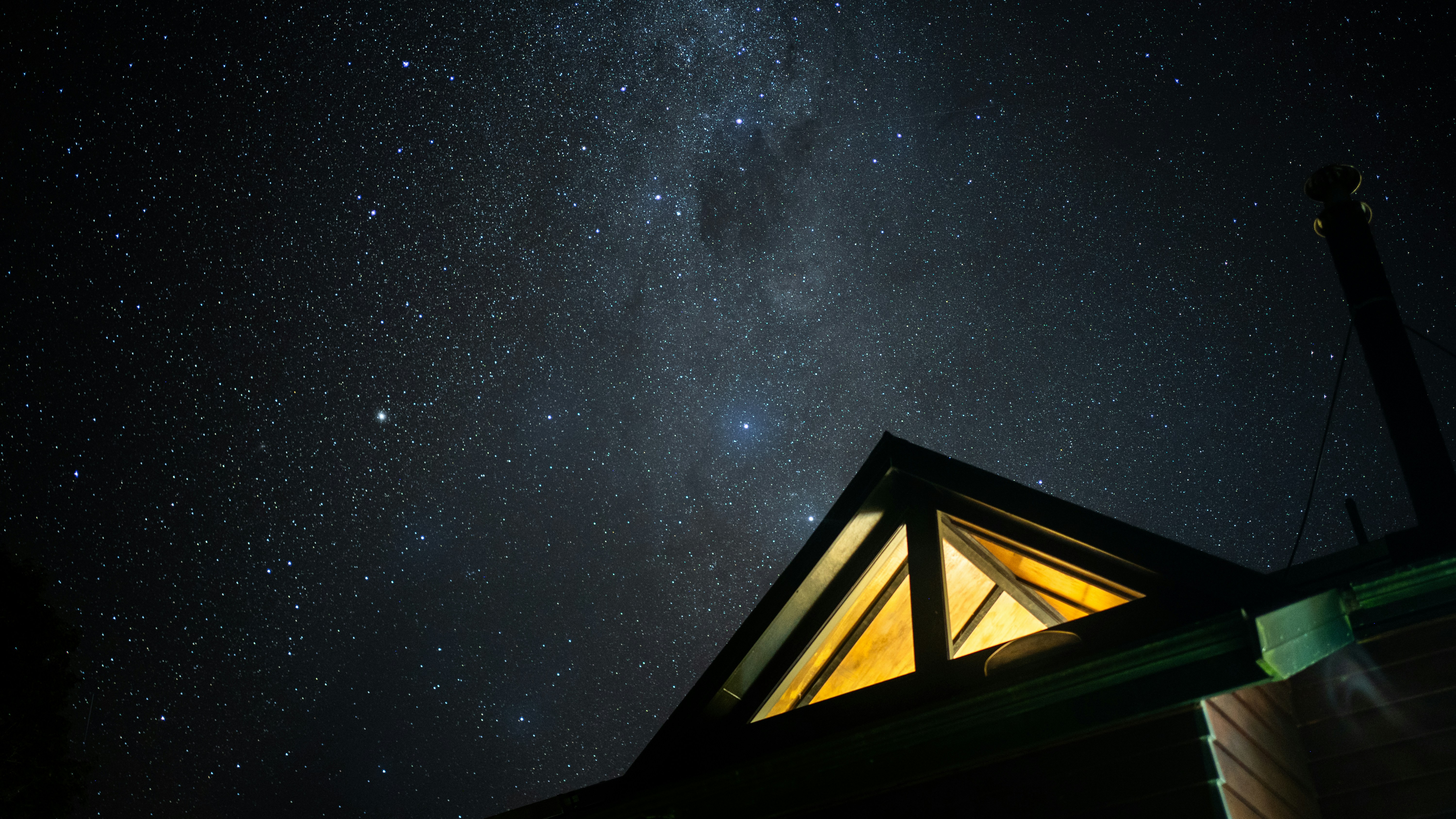Starry Roofline: A Quiet Night Beneath the Milky Way