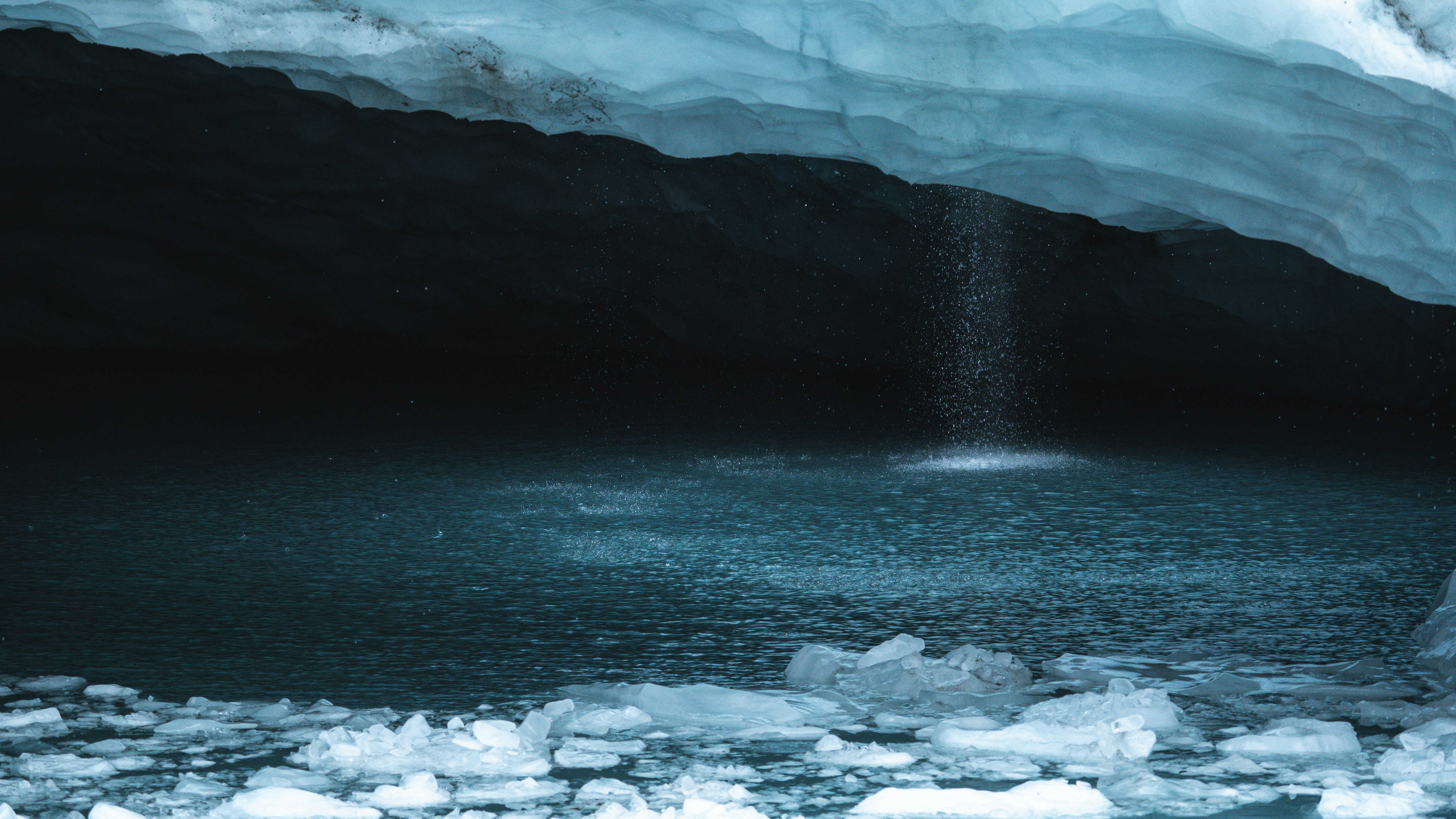Midnight Inlet: Ice Cave beneath a Glacial Arch