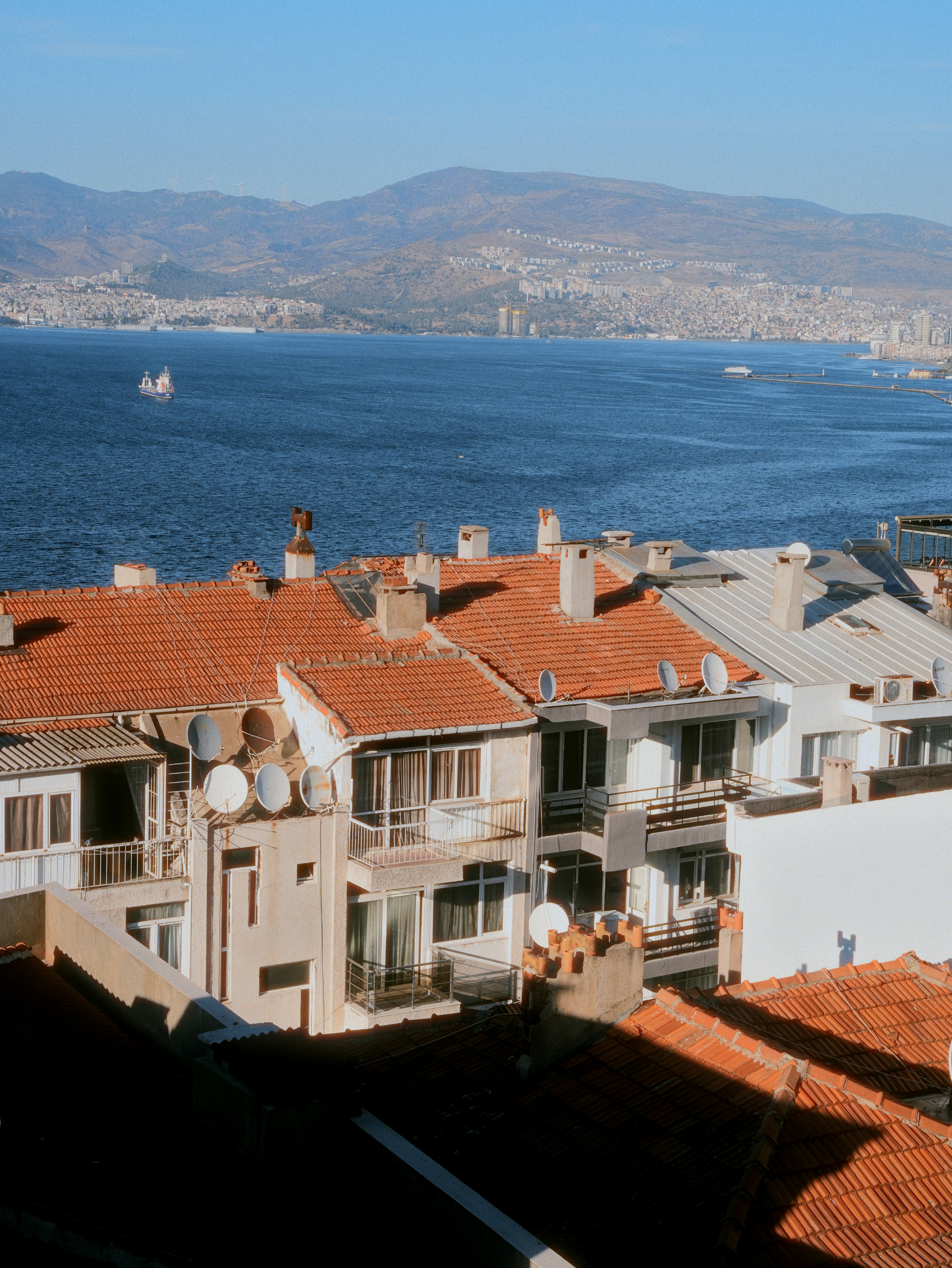 Terracotta Rooftops Facing a Calm Sea
