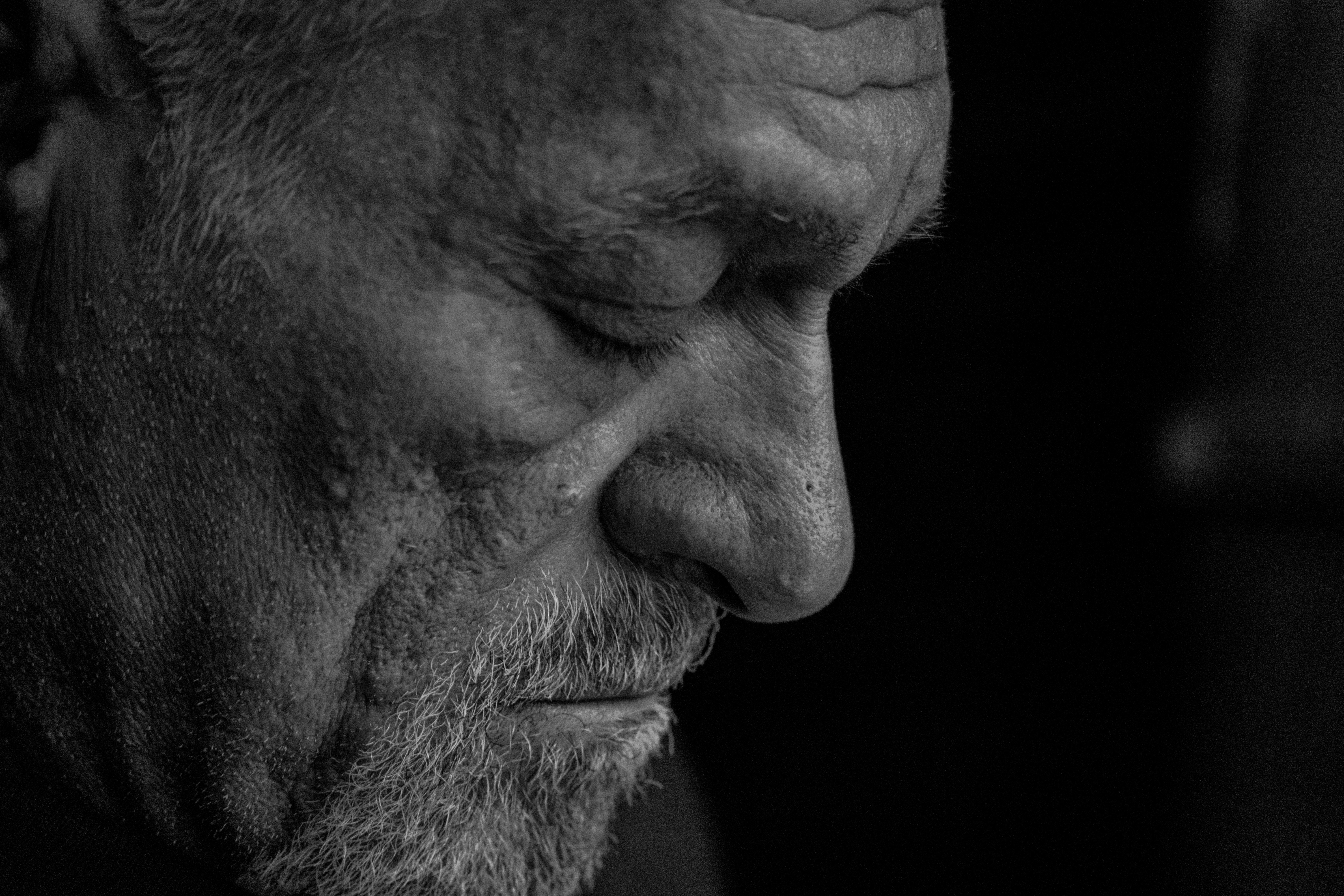 Quiet Weathered Wisdom: A Luminous Close-Up of an Elderly Face