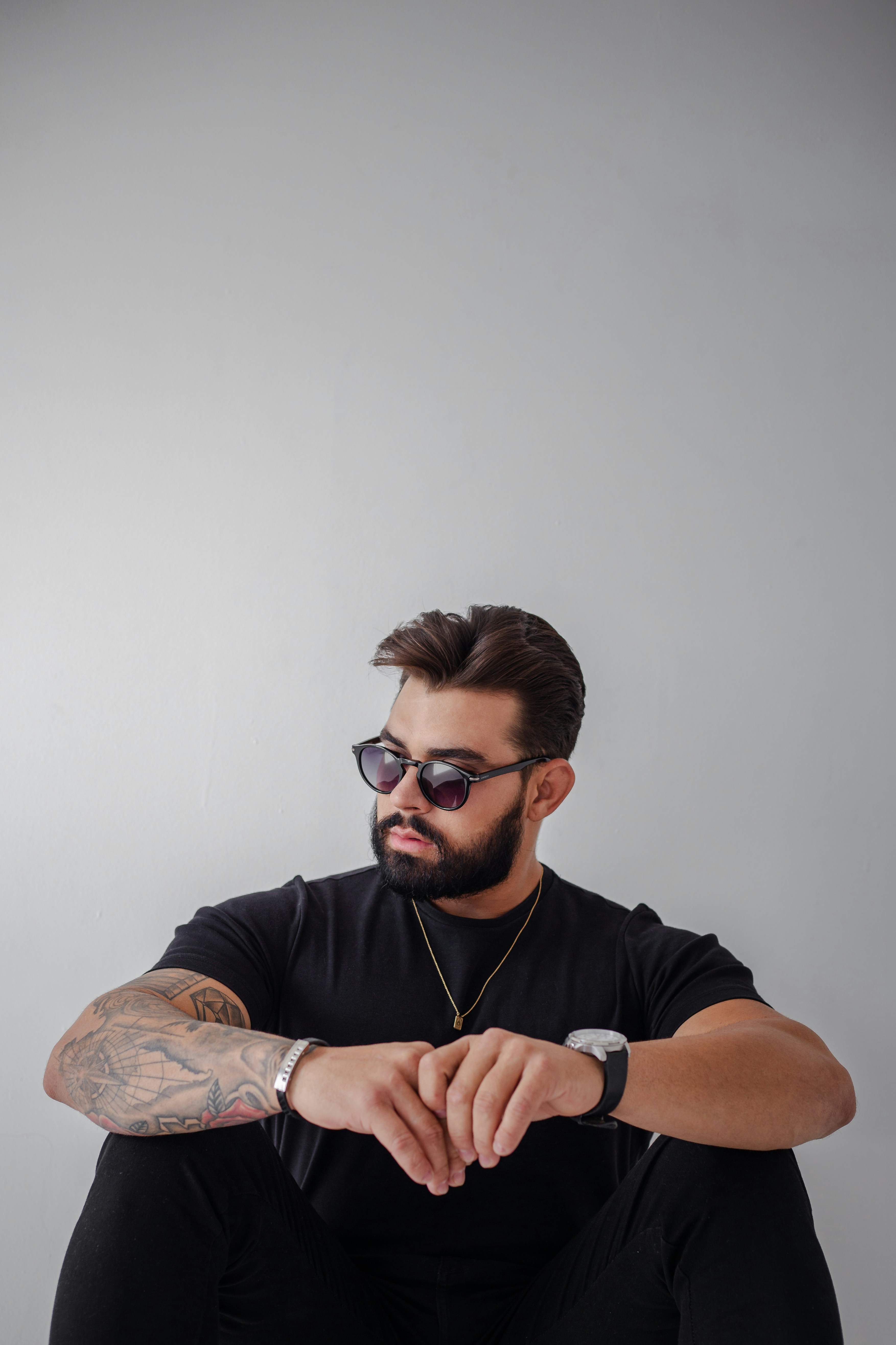 Shadowed Confidence: A Self-Assured Moment in Black