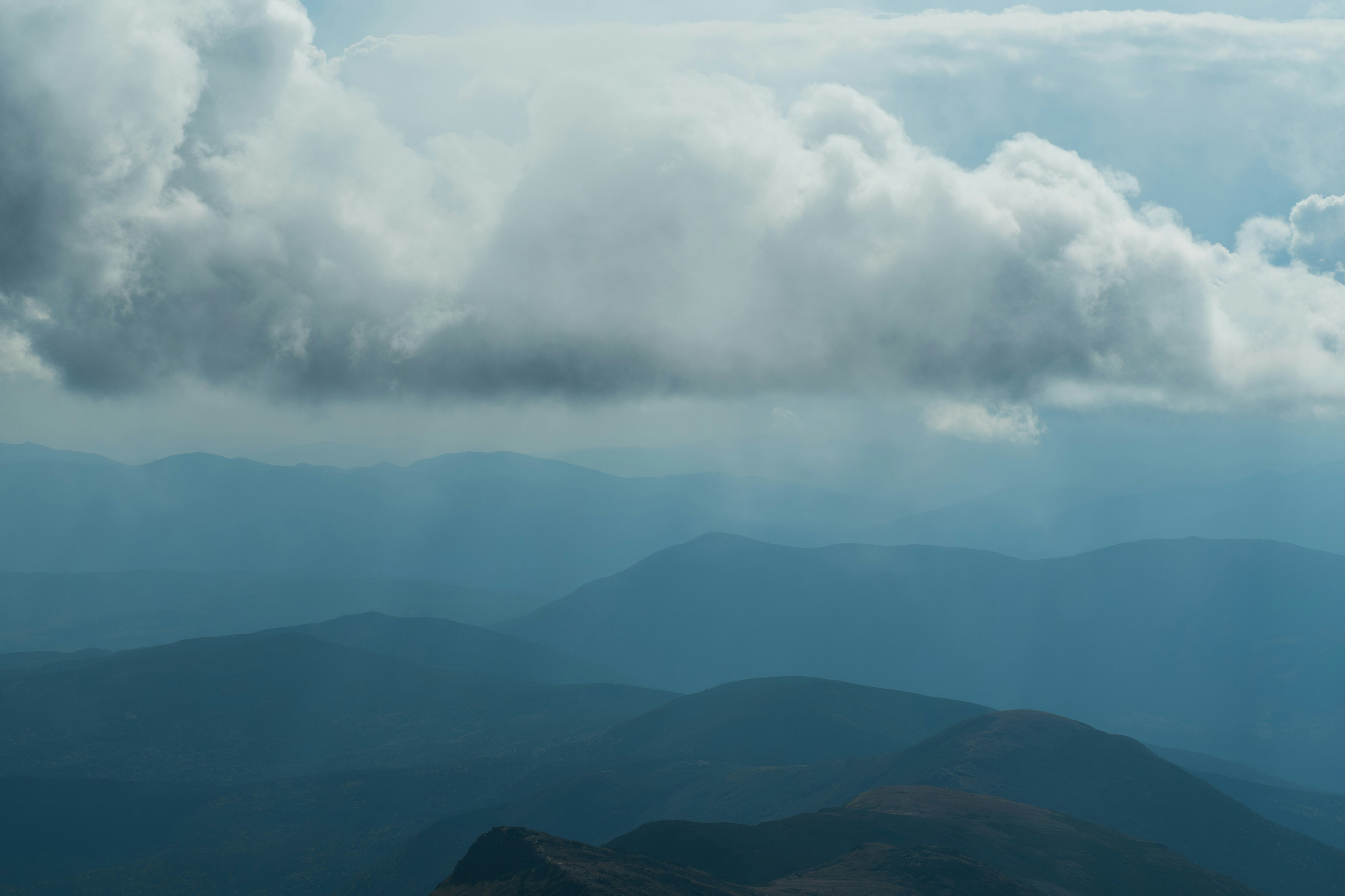 Blue Horizons Over Quiet Peaks