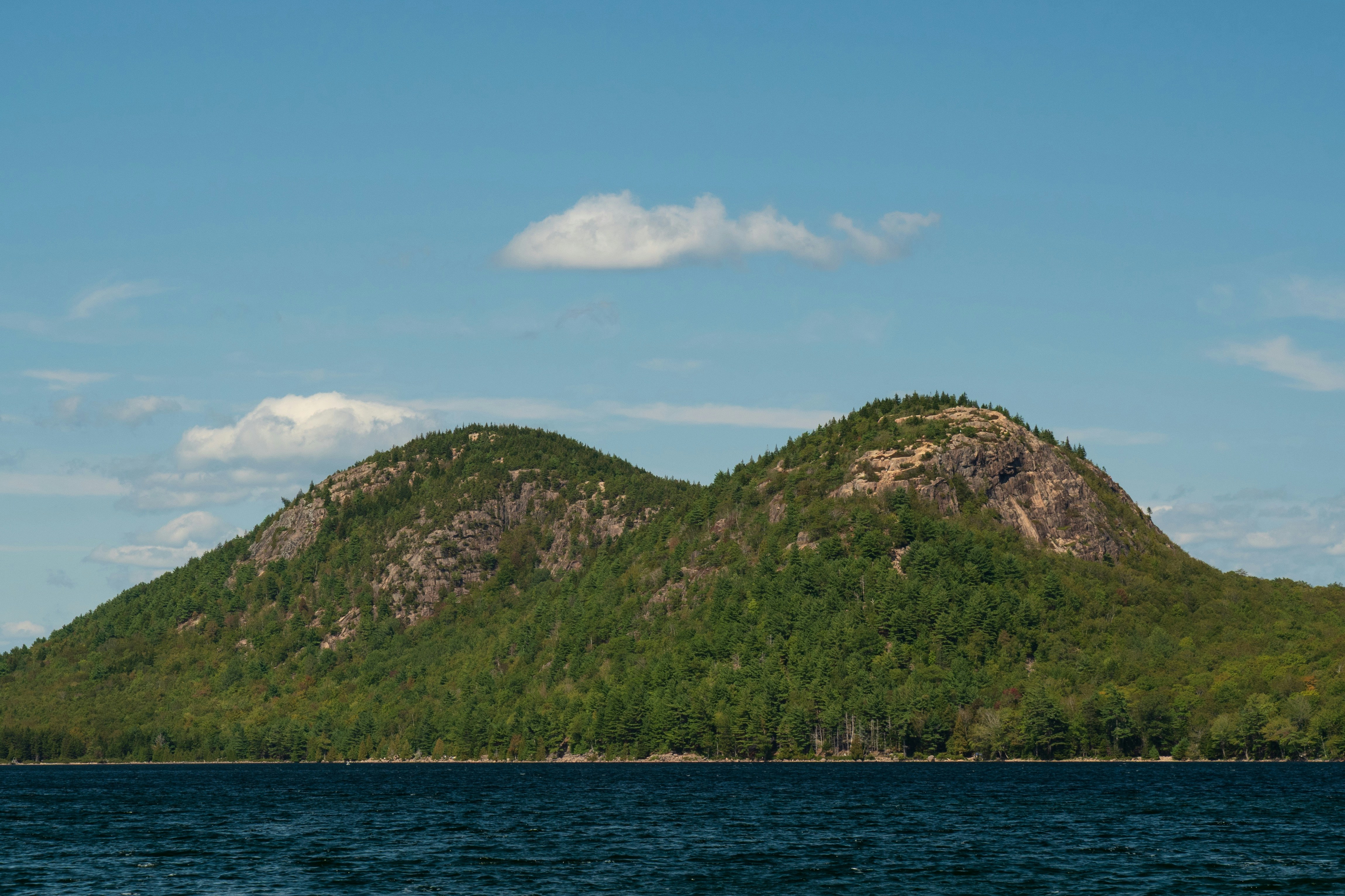 Verdant Island Crowned by a Quiet Peak