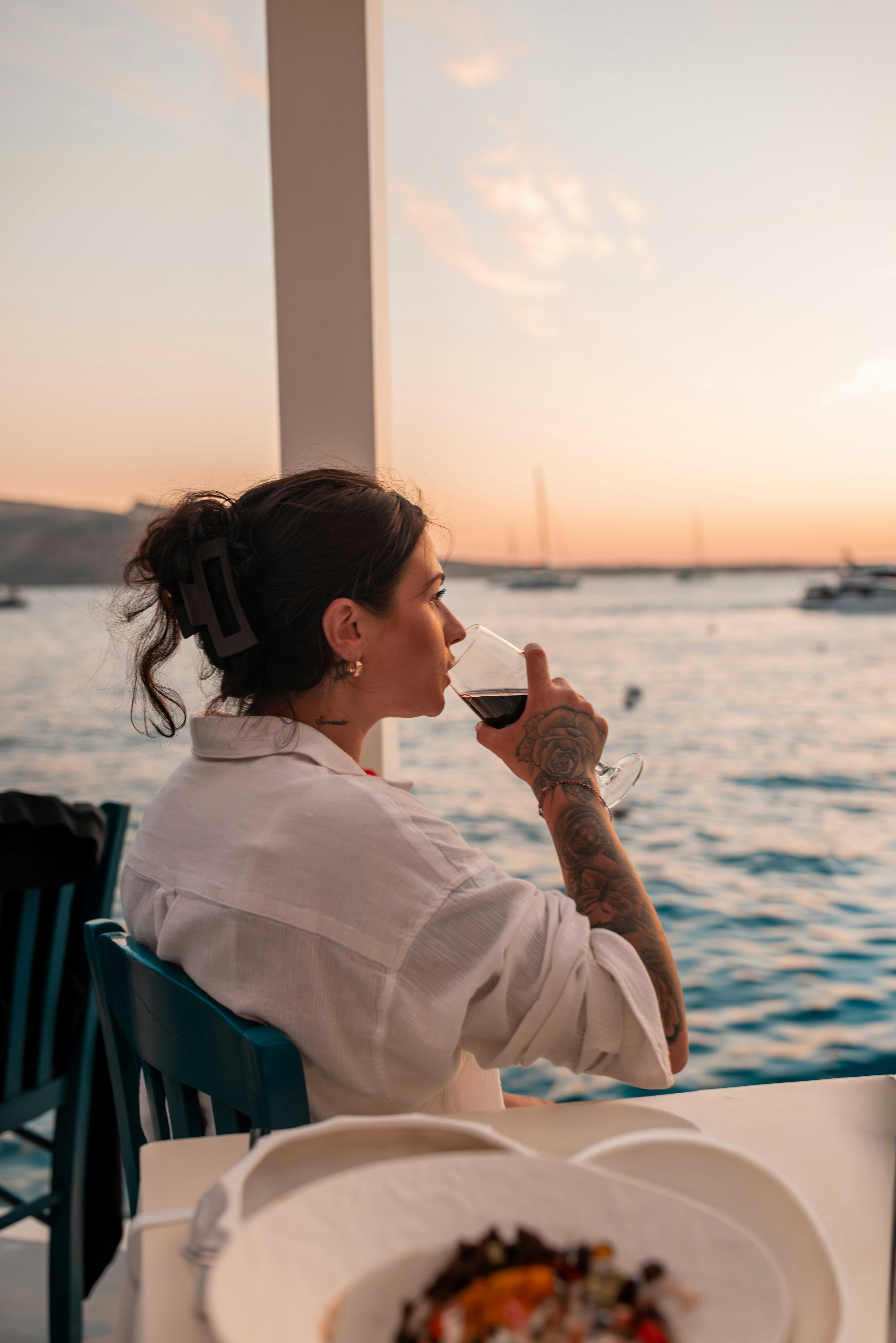 Sunset Sips by the Pier: A Quiet Moment in White Linen