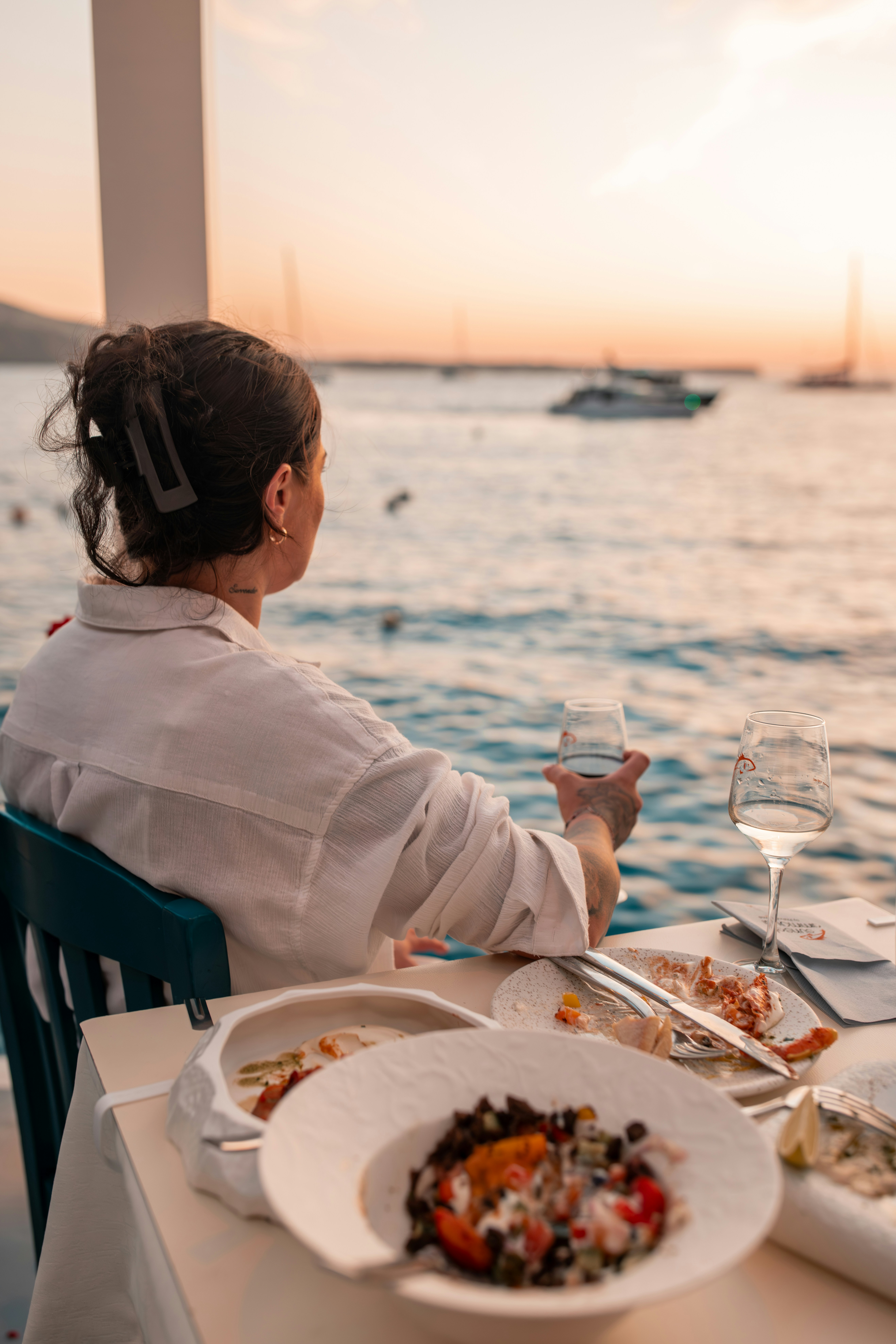 Sunset Serenade: A Quiet Toast by the Sea