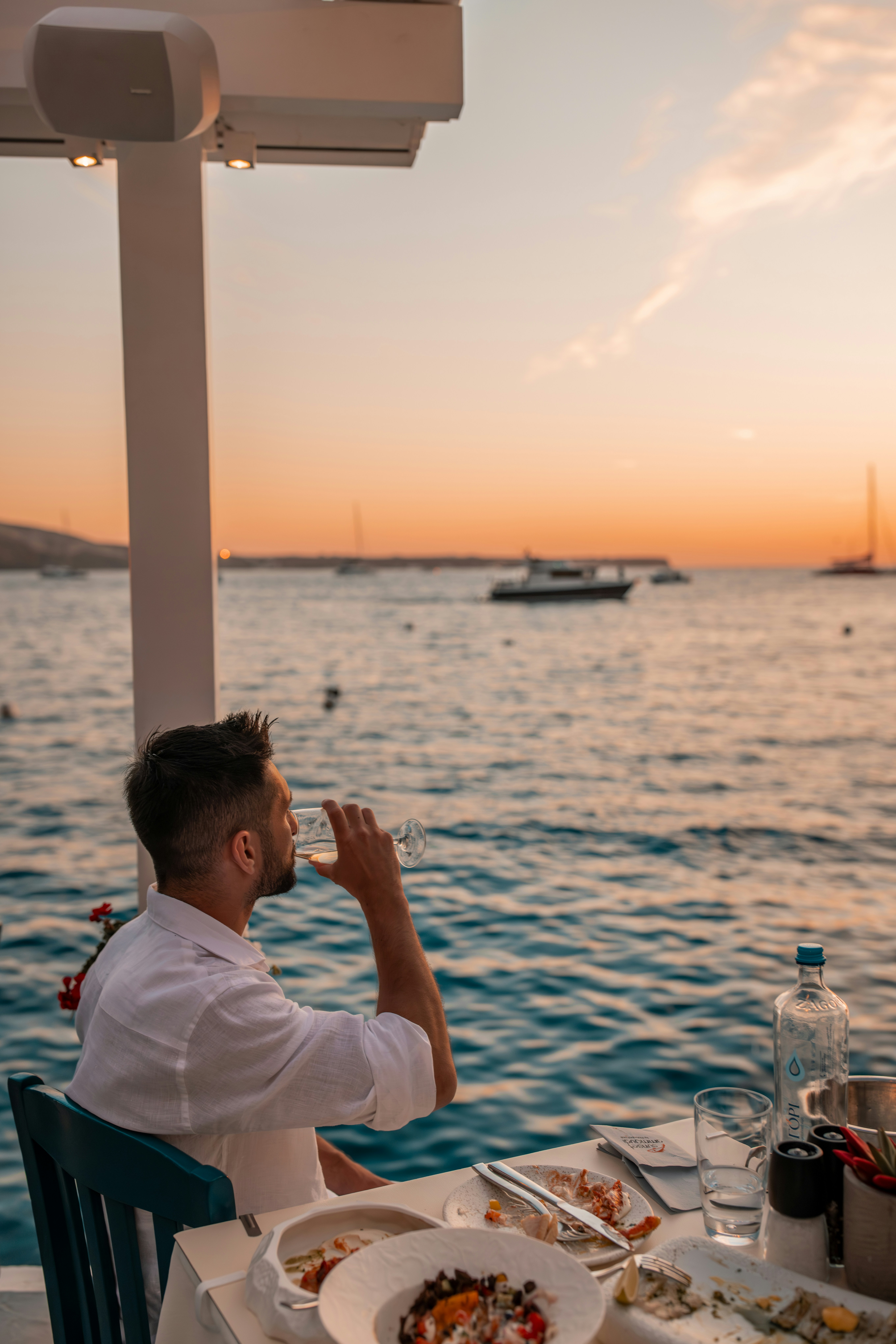 Sunset Serenade: Toast by the Turquoise Sea