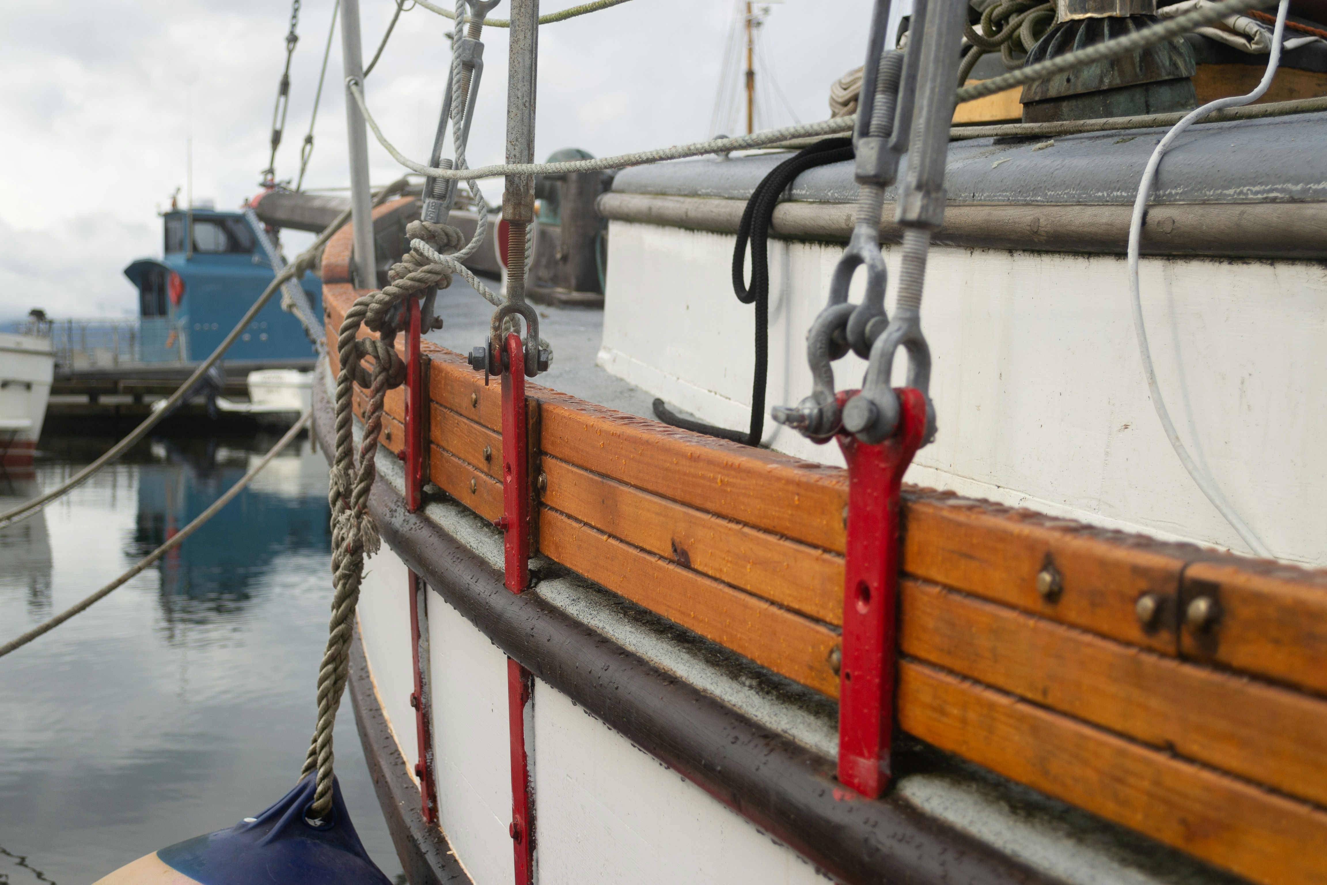 Roped Wooden Rail of a Docked Vessel