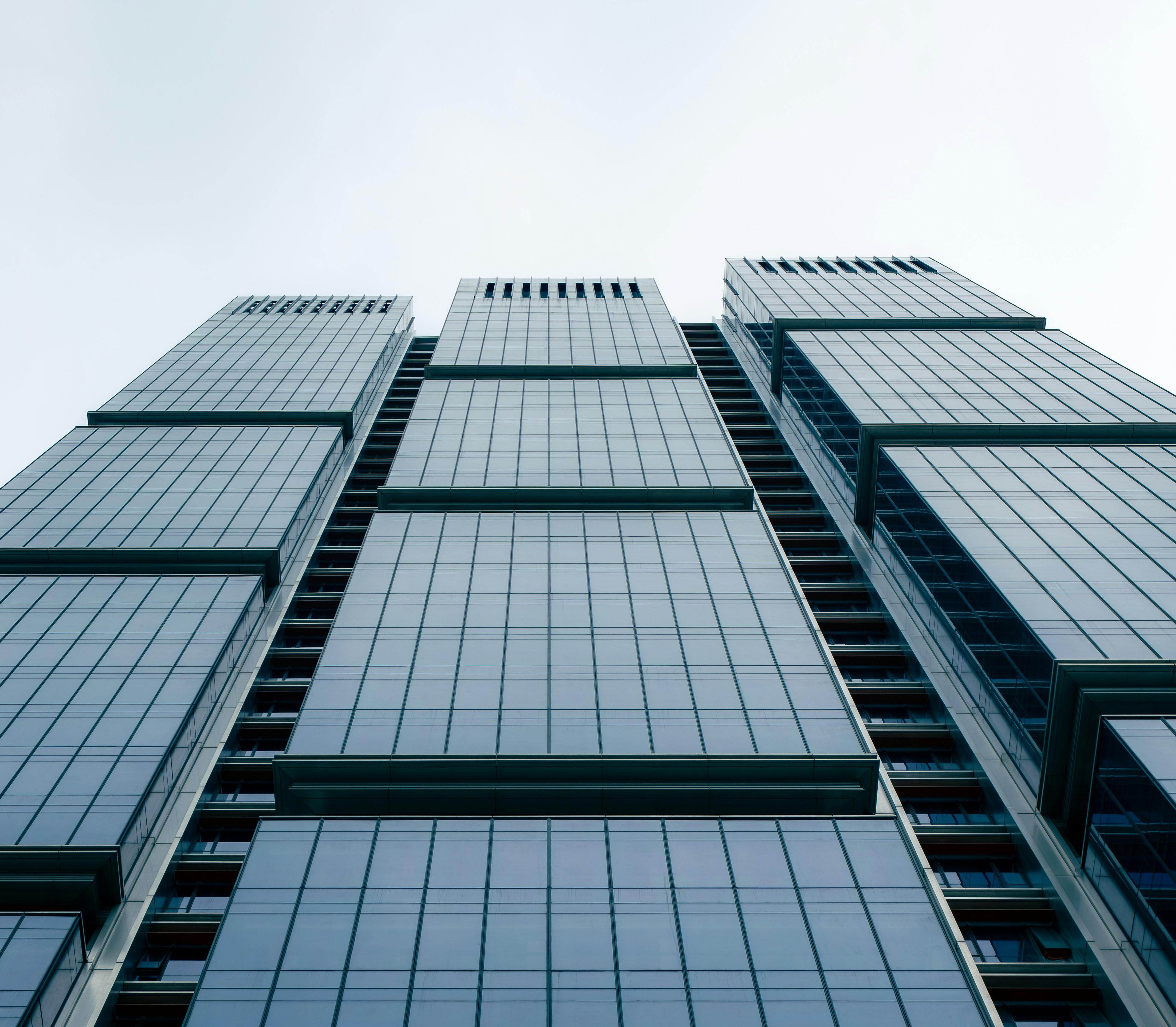 Vertical Facade: A Climb Through Glass and Sky