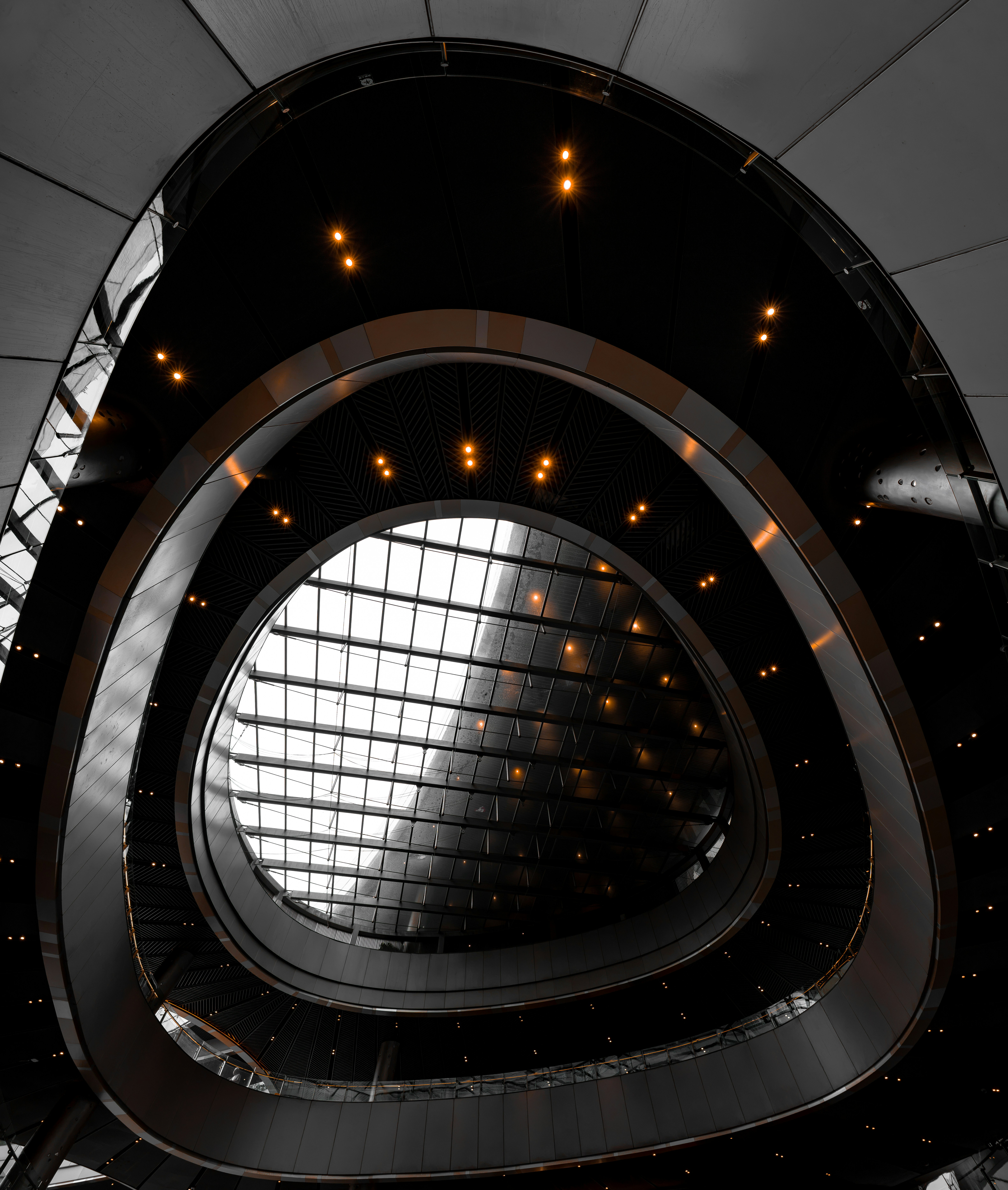 Spiral Atrium: Concentric Rails Reeling into Light