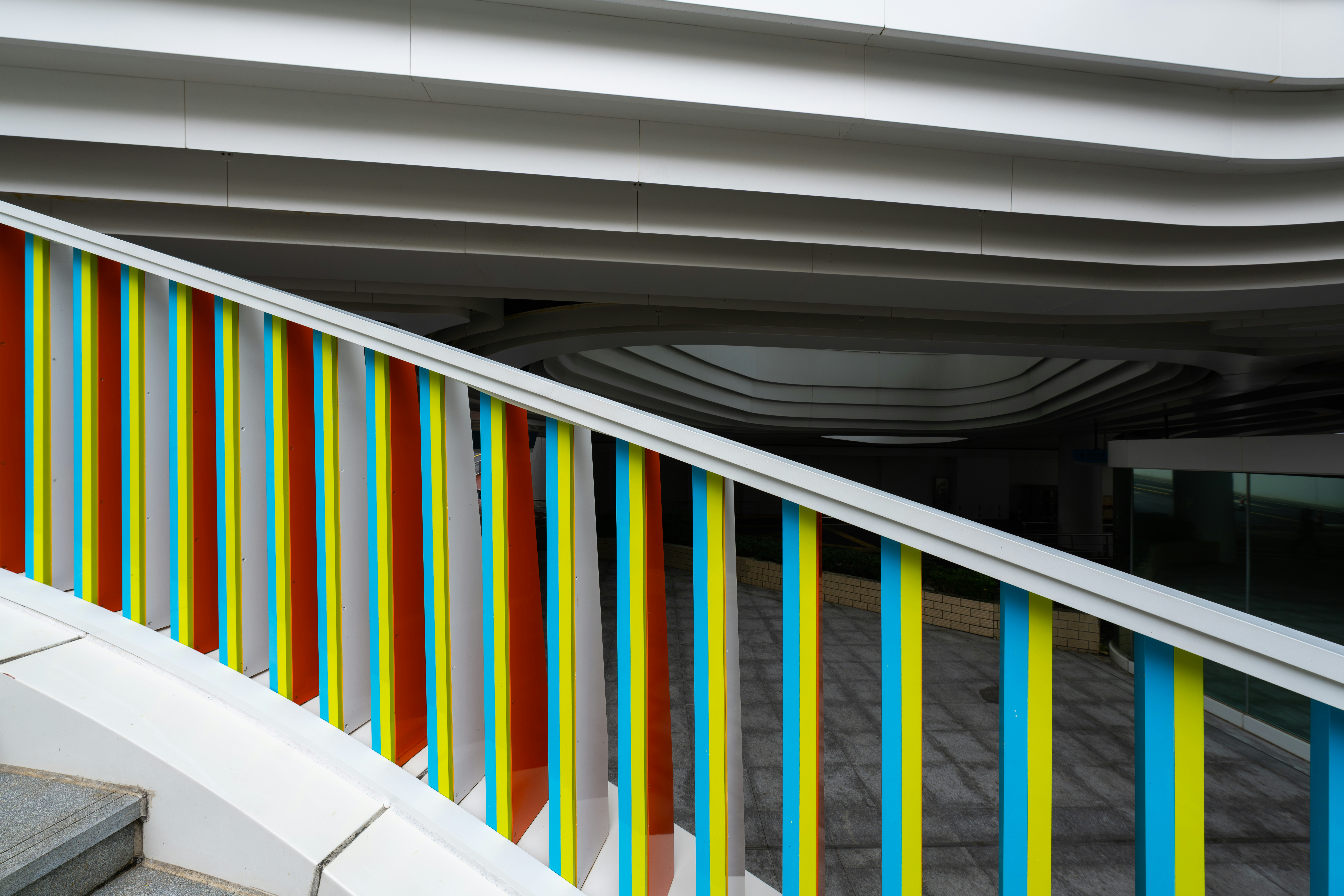 Chromatic Stairway: A Ribboned Corridor of Color