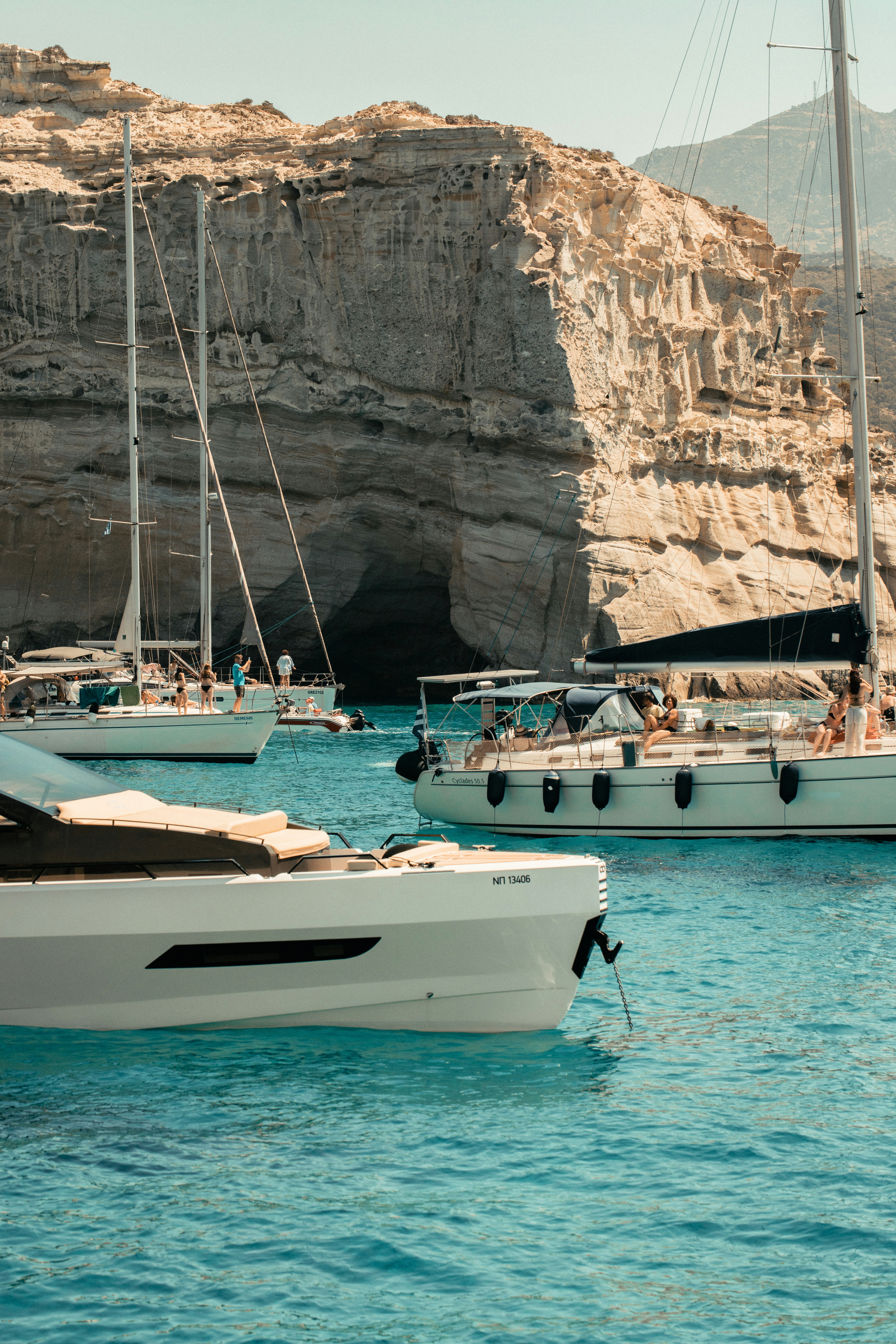 Harbor Mist: Boats resting at the Caves of the Blue
