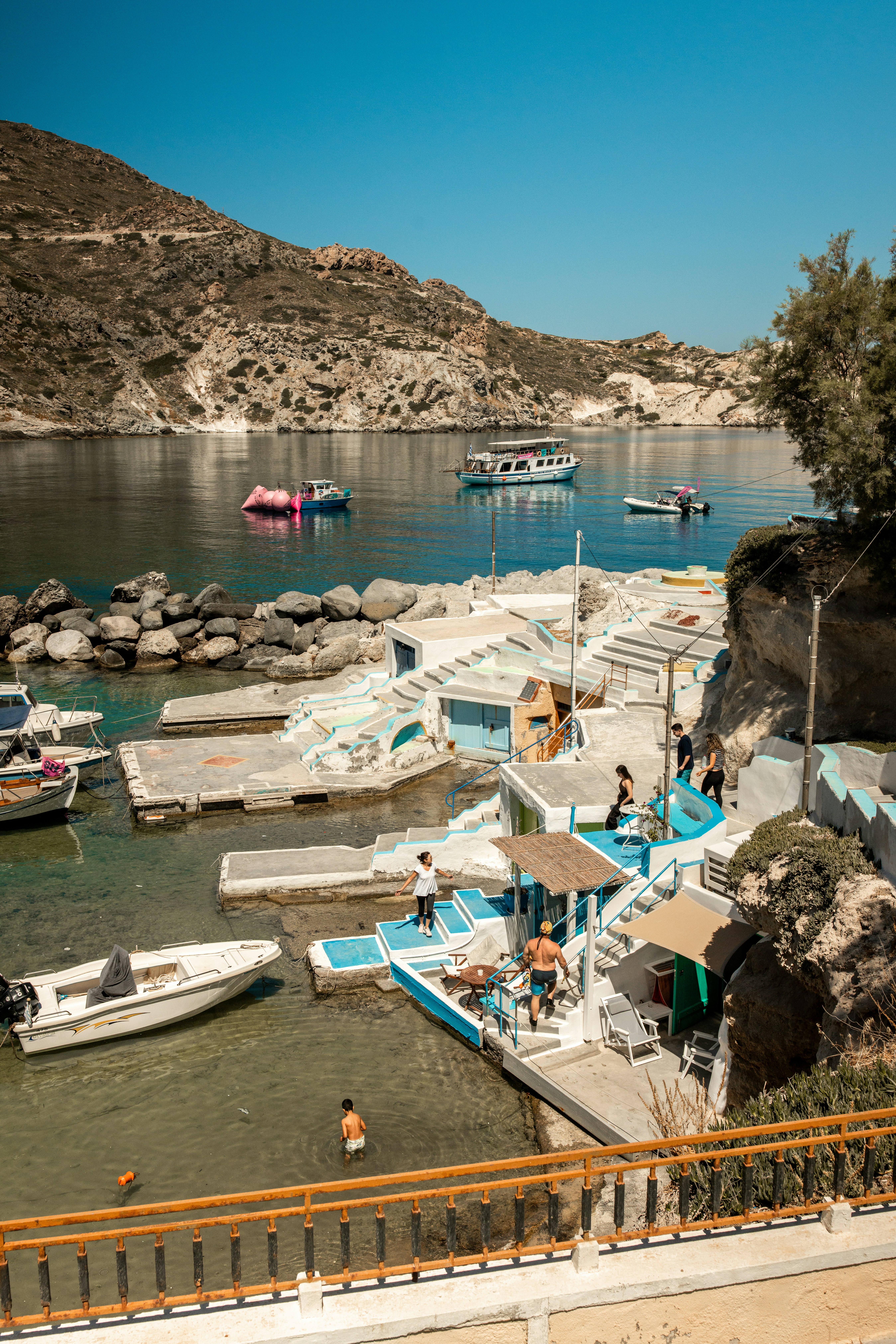 Harbor Steps and Bathing Boats under Aegean Light