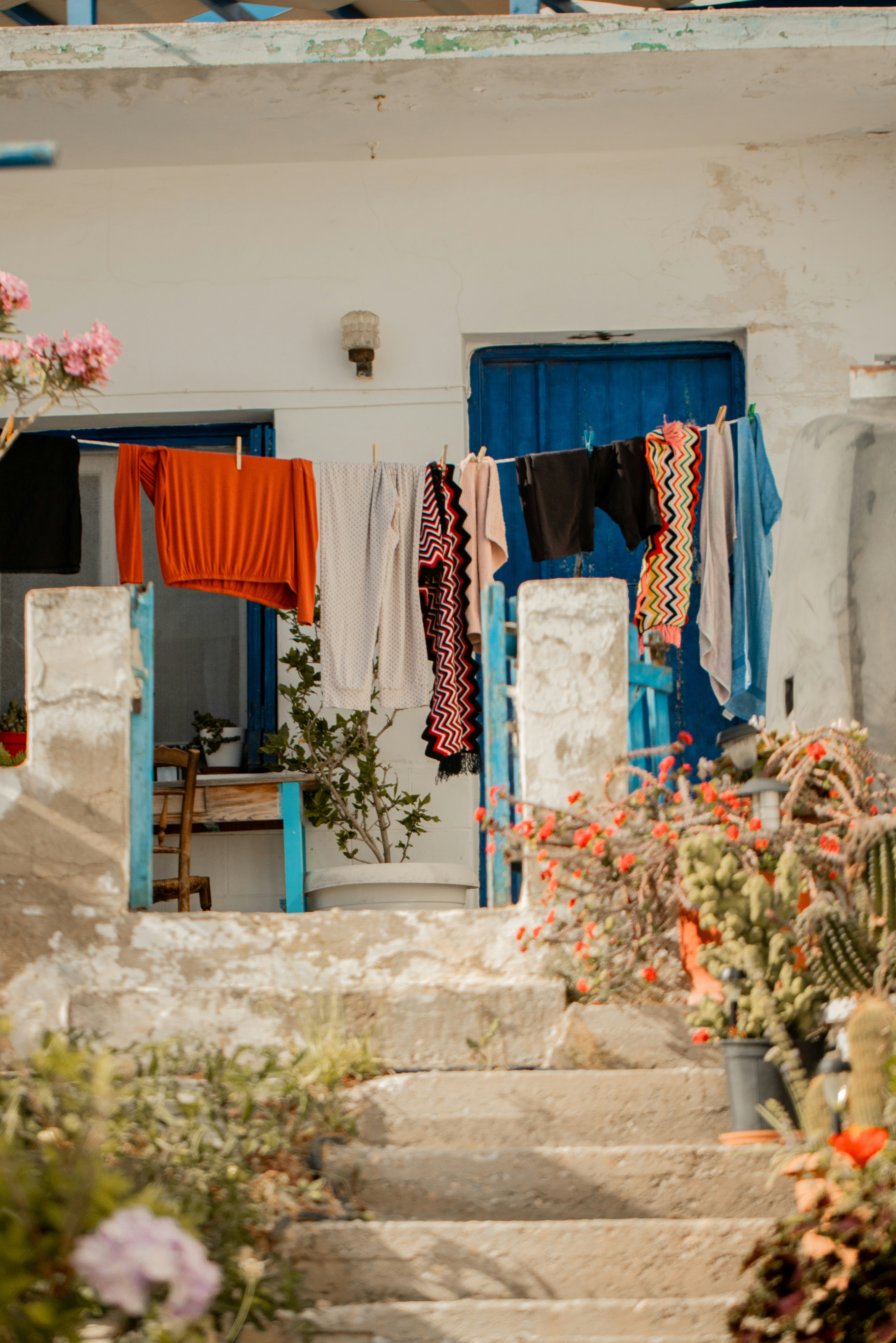 Laundry Line Over a Sunlit Courtyard in a Mediterranean Terrace