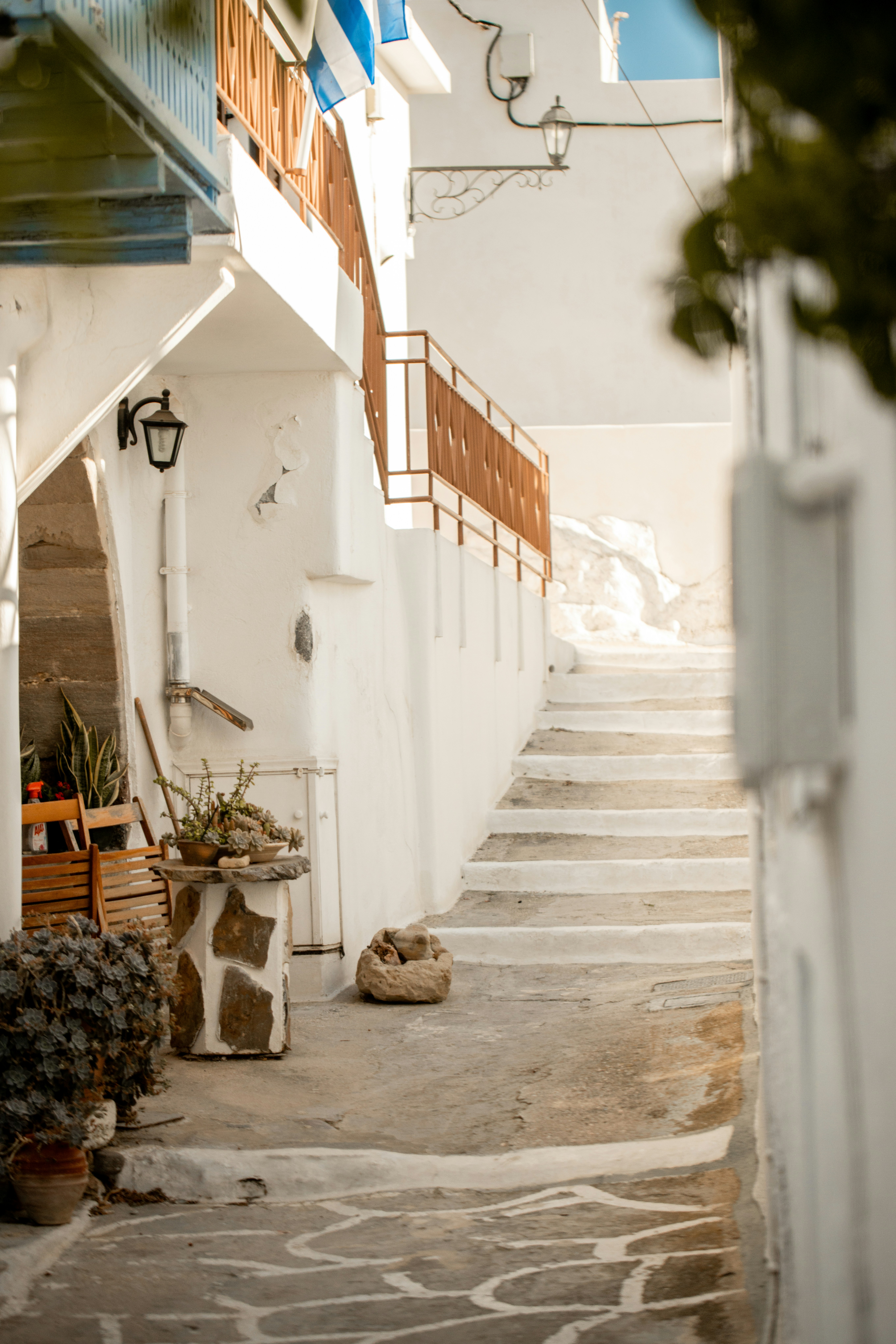 Sunlit Alley in Whitewashed Steps